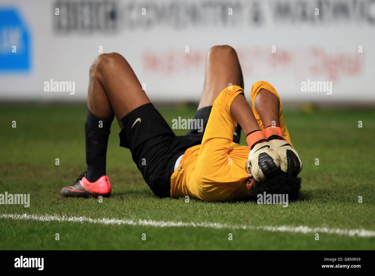 Coventry City goalkeeper Corey Addai looks dejected after conceeding ...