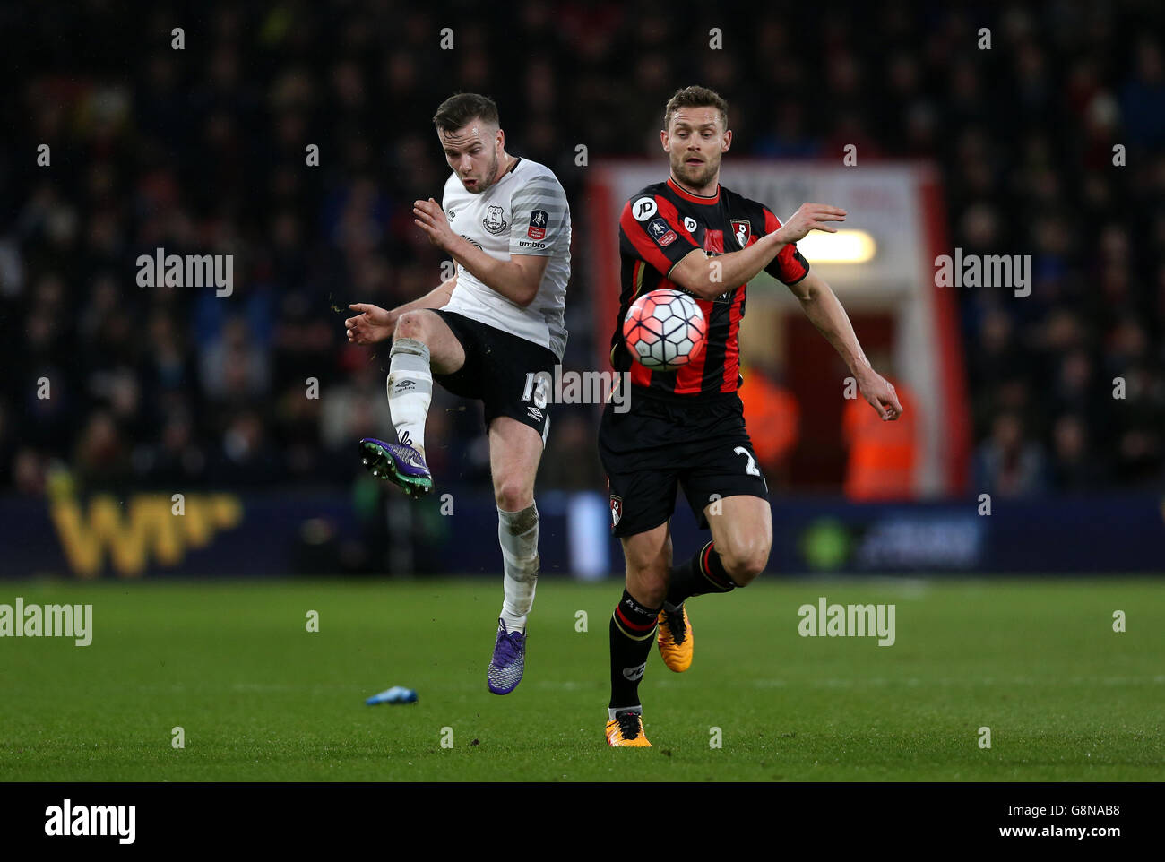 Everton's Tom Cleverley (left) and AFC Bournemouth's Simon Francis ...