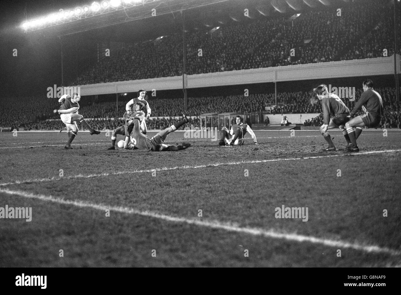 Arsenal's John Radford shoots for goal but is thwarted by Portsmouth No ...