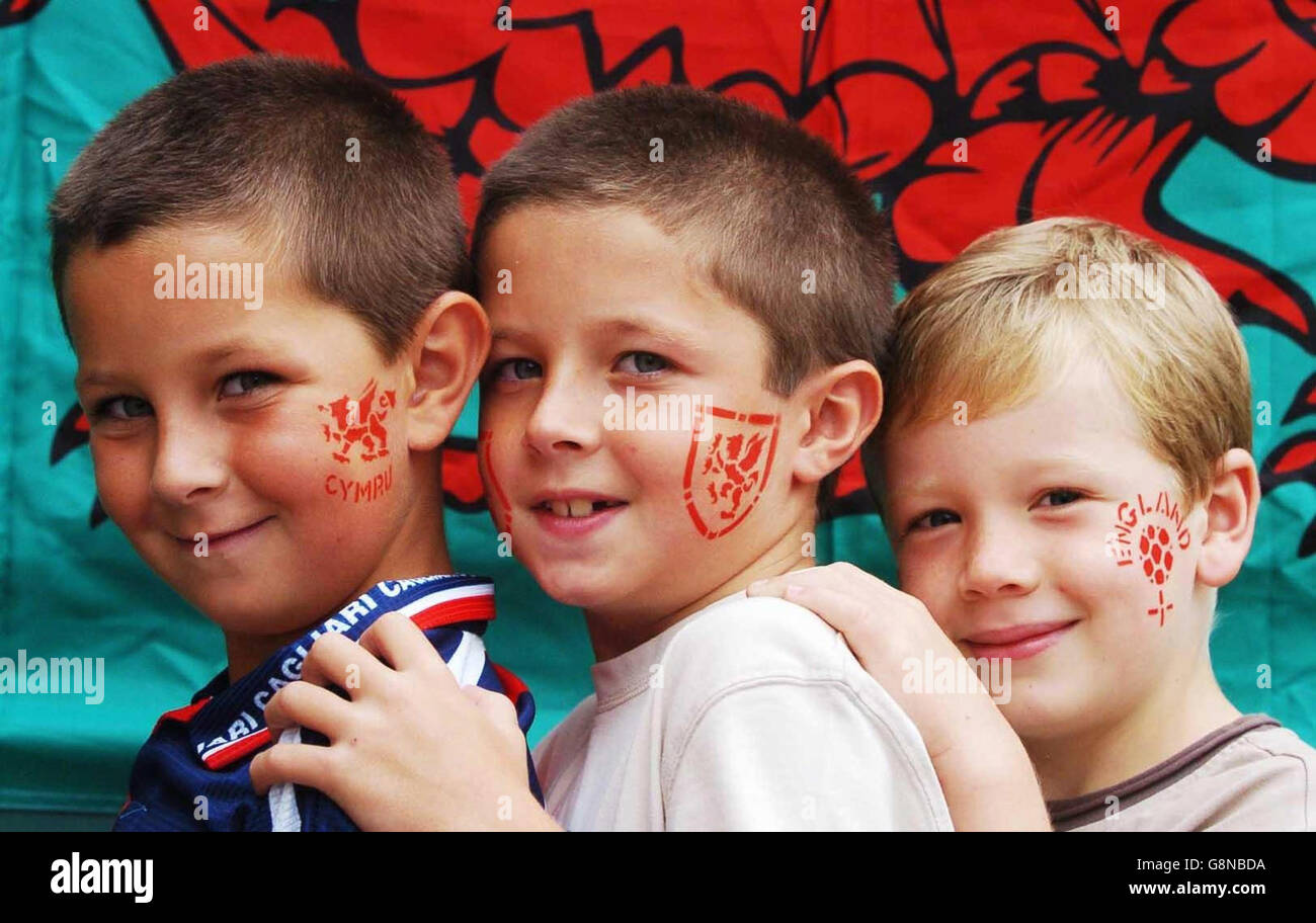 Football fans (left to right) Tom James (6), Jack James (8) and Tobi ...