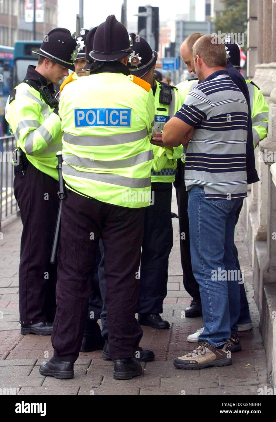 Police check football fans outside the millennium stadium hi-res stock ...