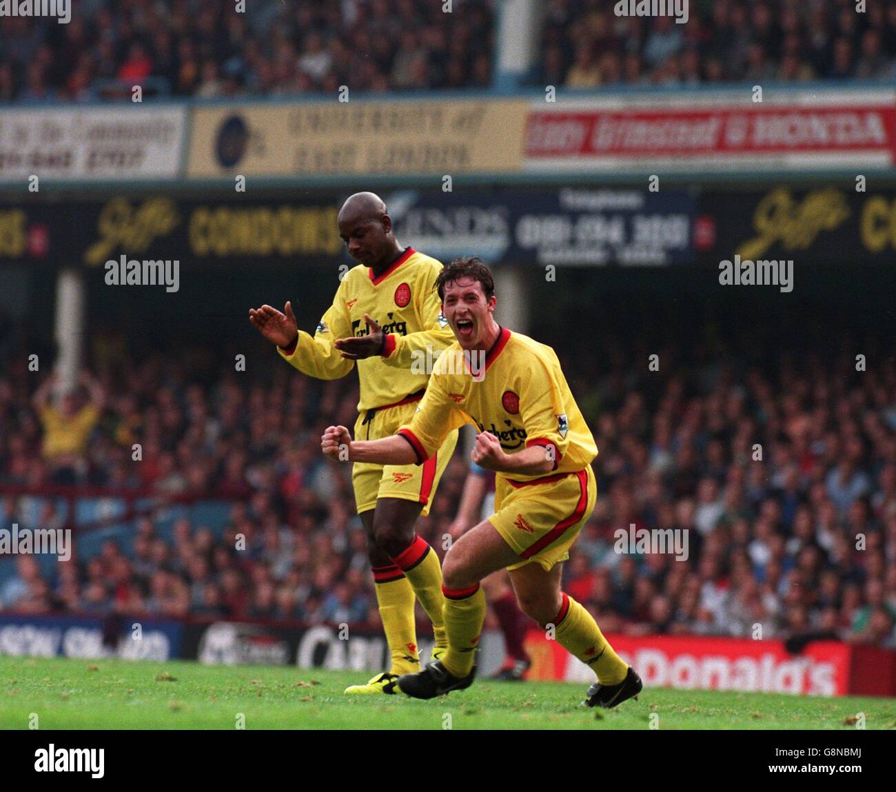 Liverpool's Michael Thomas (left) and Robbie Fowler (right) celebrate ...