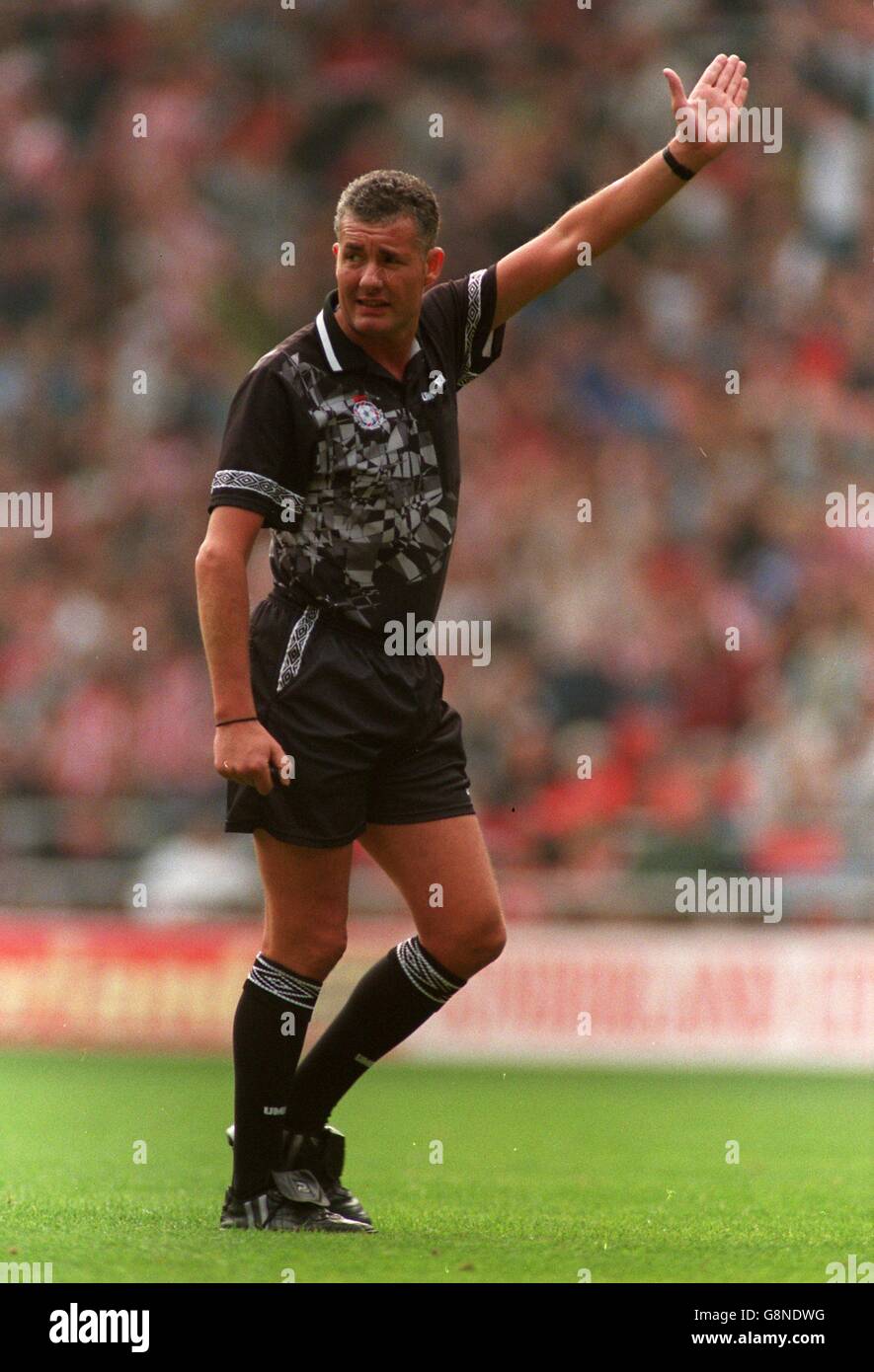 Black full action front view one official football hi-res stock ...