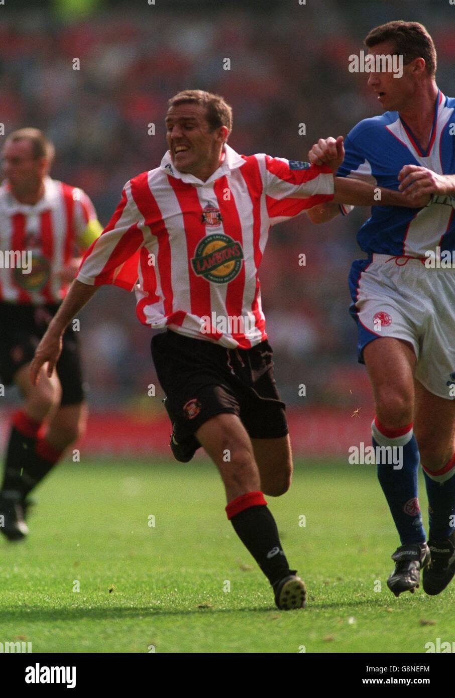 Alex Rae of Sunderland (left) holds off Middlesbrough's Nigel Pearson ...