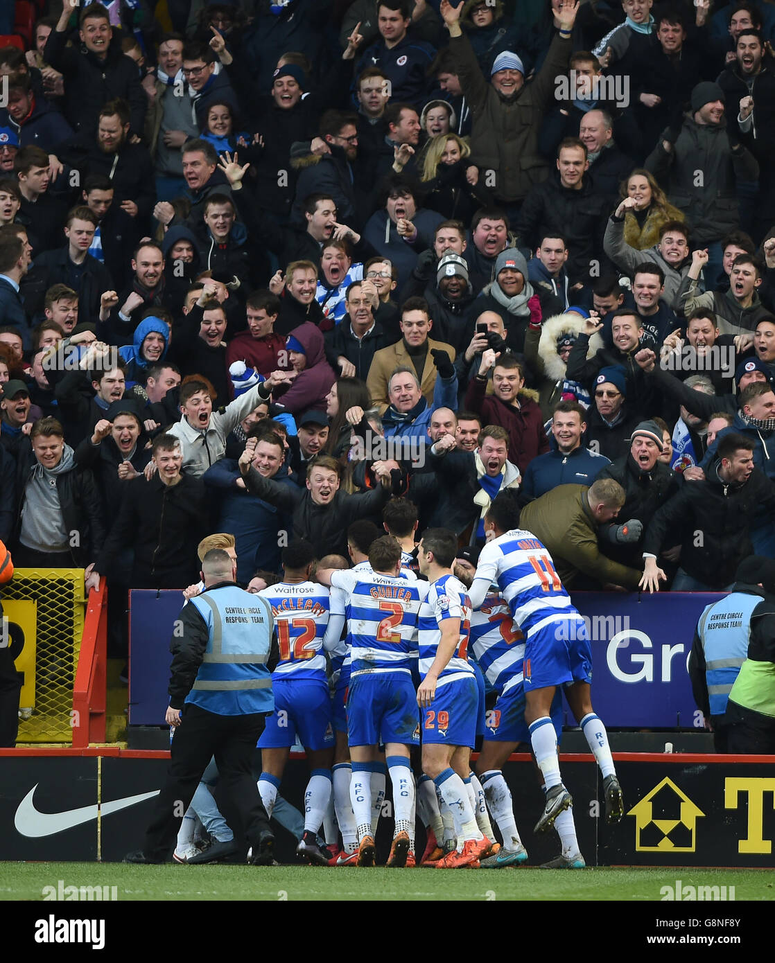 Reading's players celebrate in front of their fans after scoring a late ...
