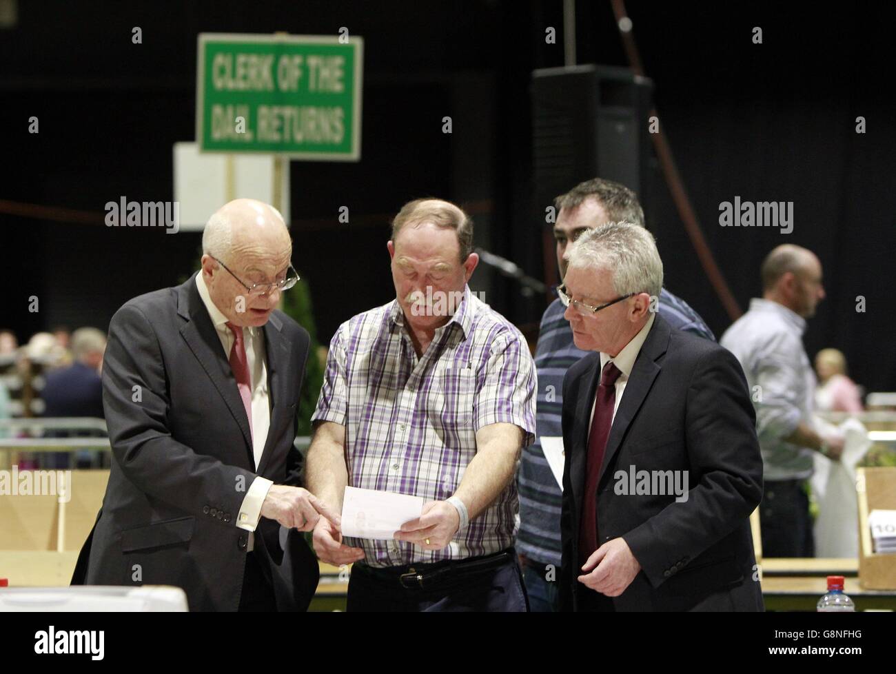 Count staff go through paperwork at the election count centre at the ...