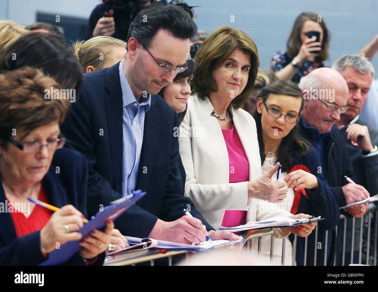 Tanaiste and Labour leader Joan Burton (centre) awaits the declaration ...