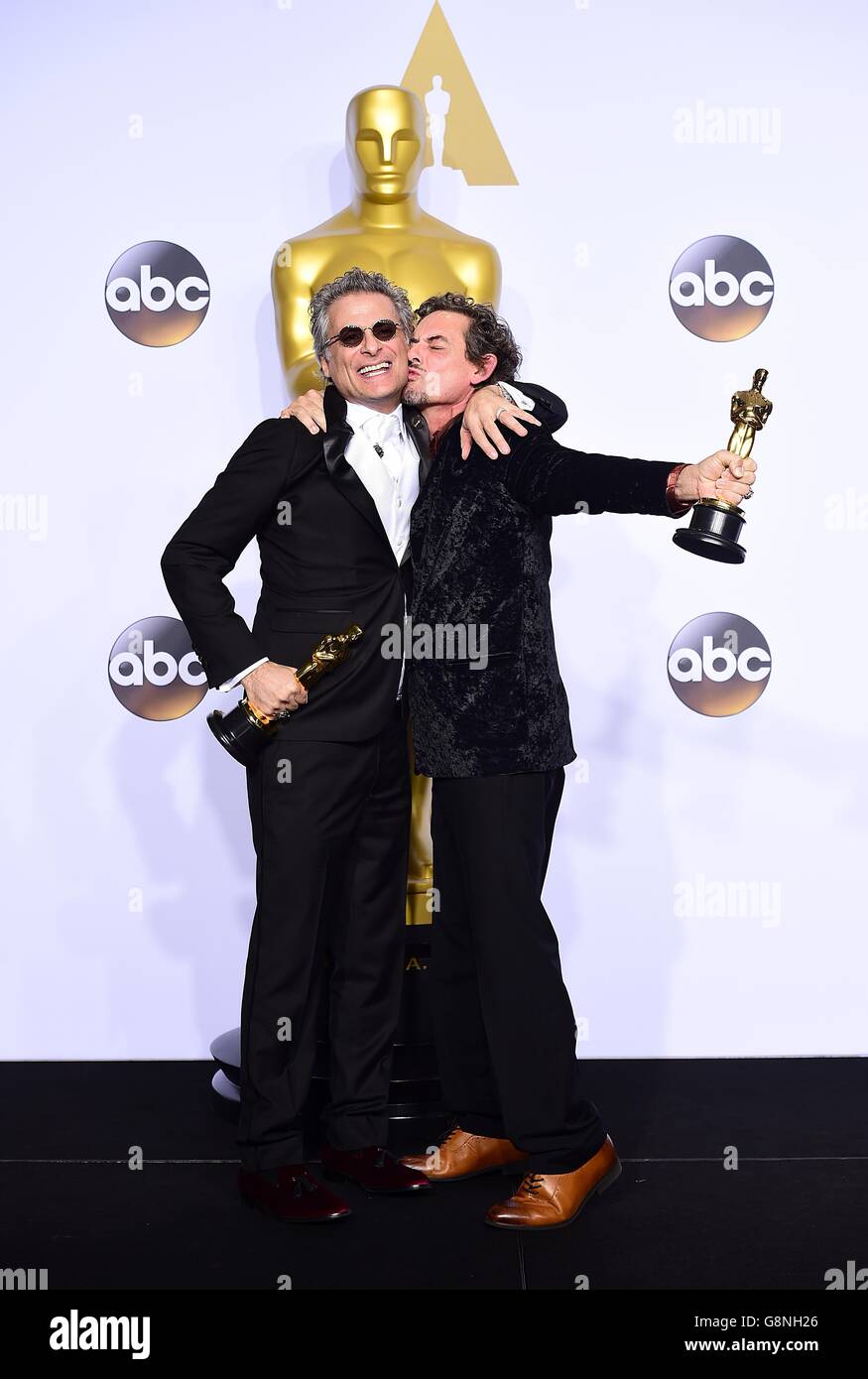Mark Mangini (left) and David White (right) with the Academy Awards for ...