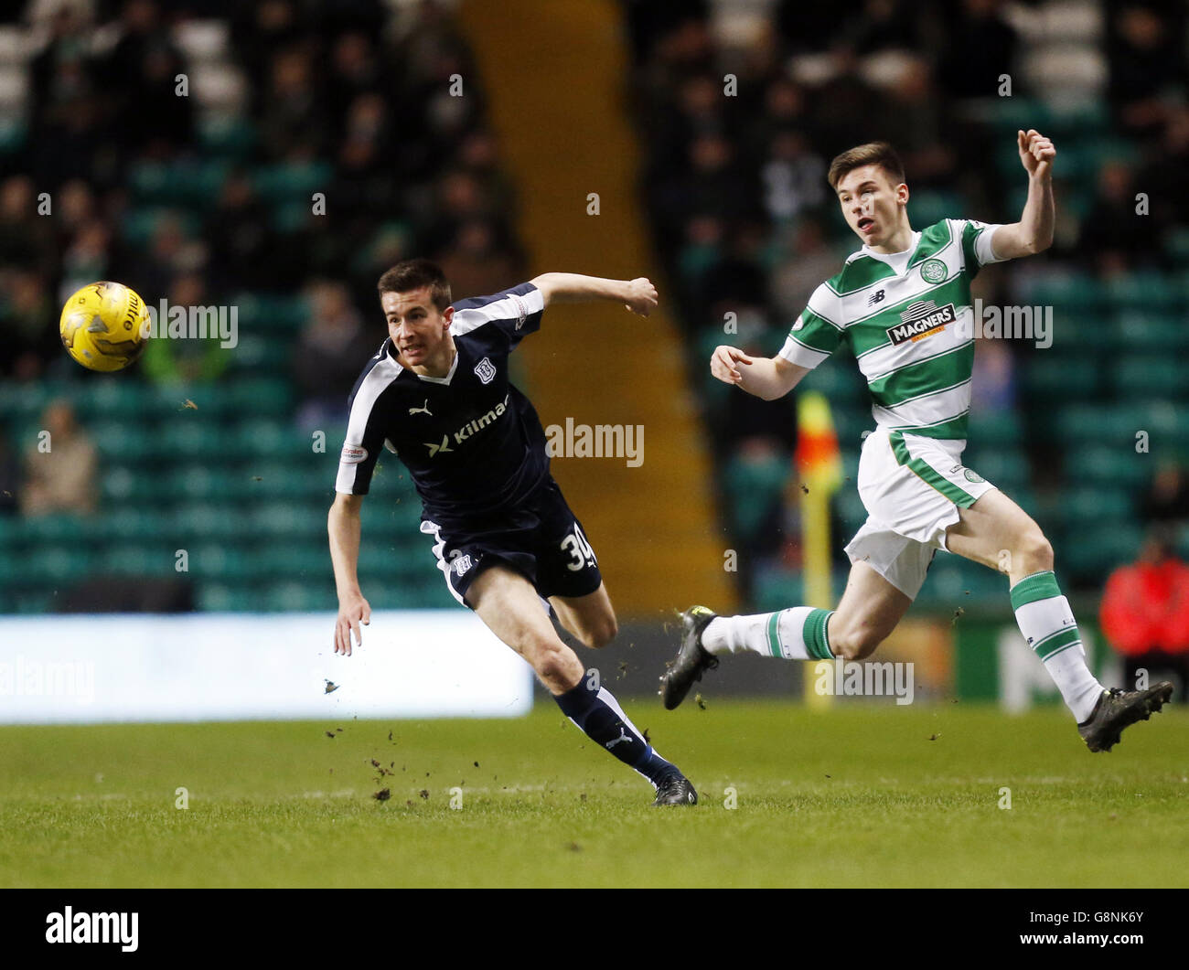 Dundee's Cammy Kerr and Celtic's Kieran Tierney (right) battle for the ...