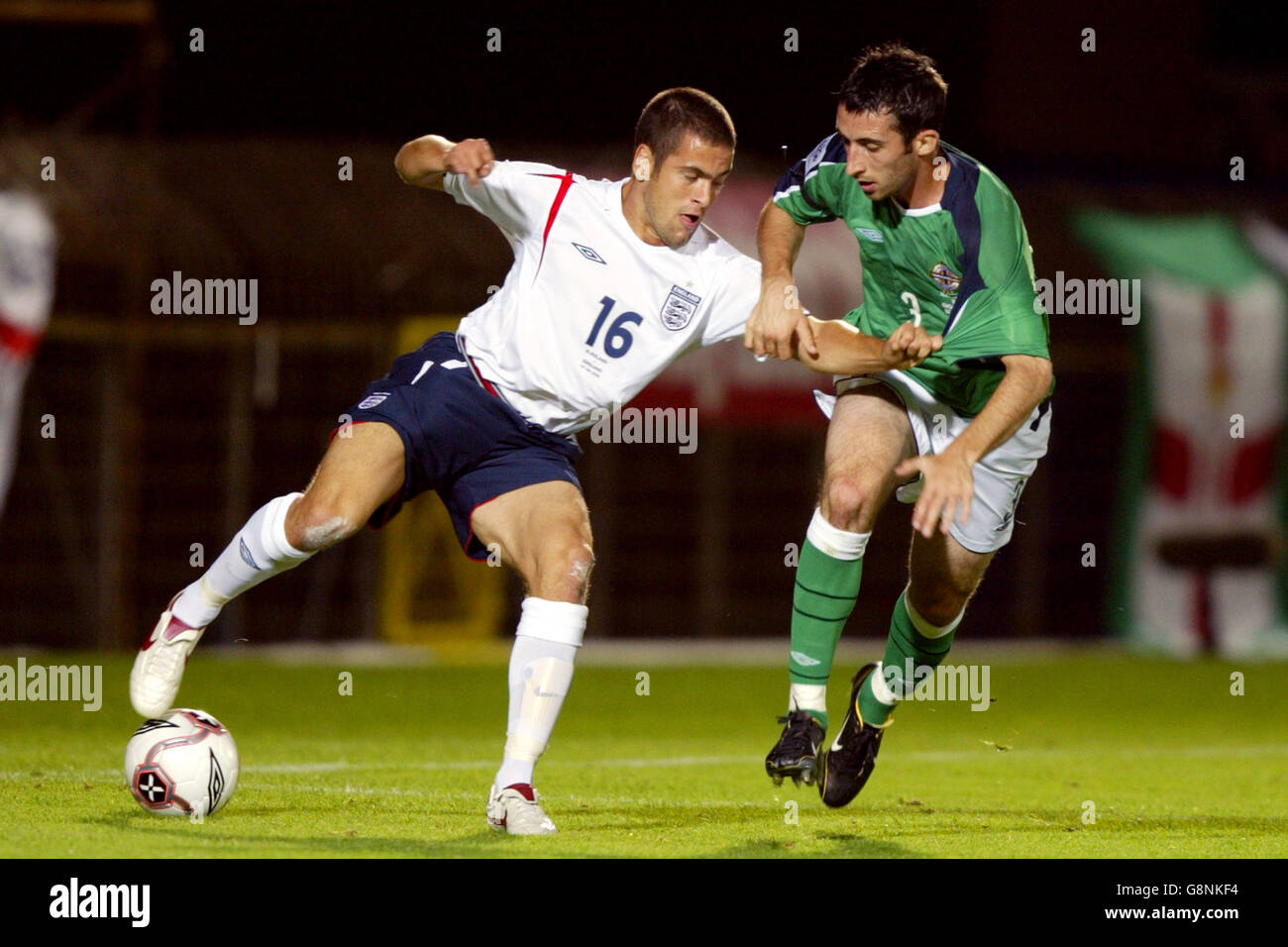 Northern Ireland's Tony Capaldi and England's Joe Cole battle for the ...