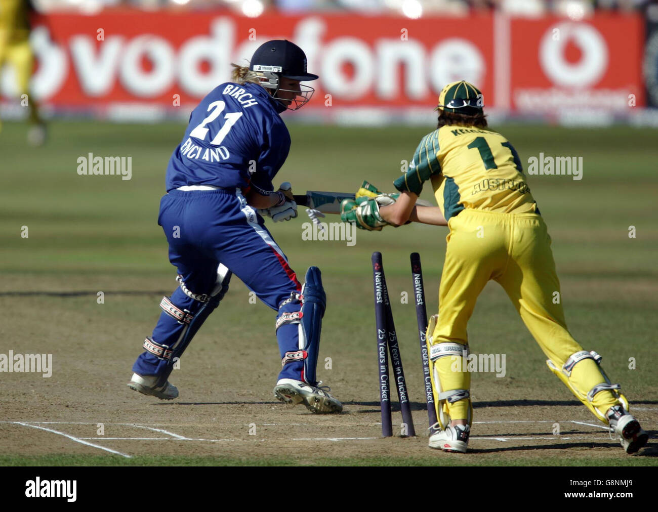 England's Rosalie Birch (L) is stumped by Australia's Lisa Keightley ...