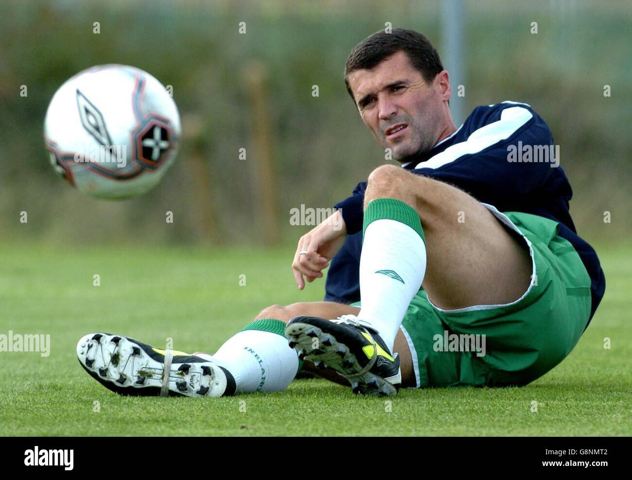 A ball bounces past Republic of Ireland's Roy Keane as he stretches ...