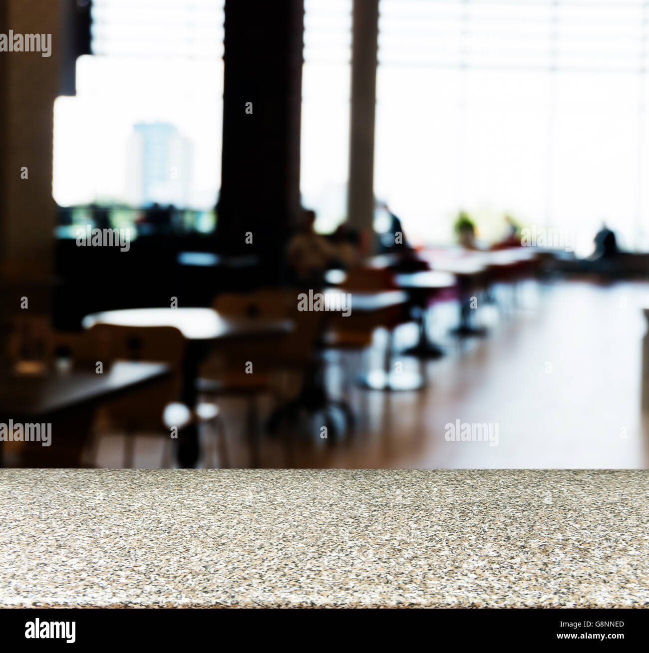 Marble empty table in front of blurred people Stock Photo - Alamy