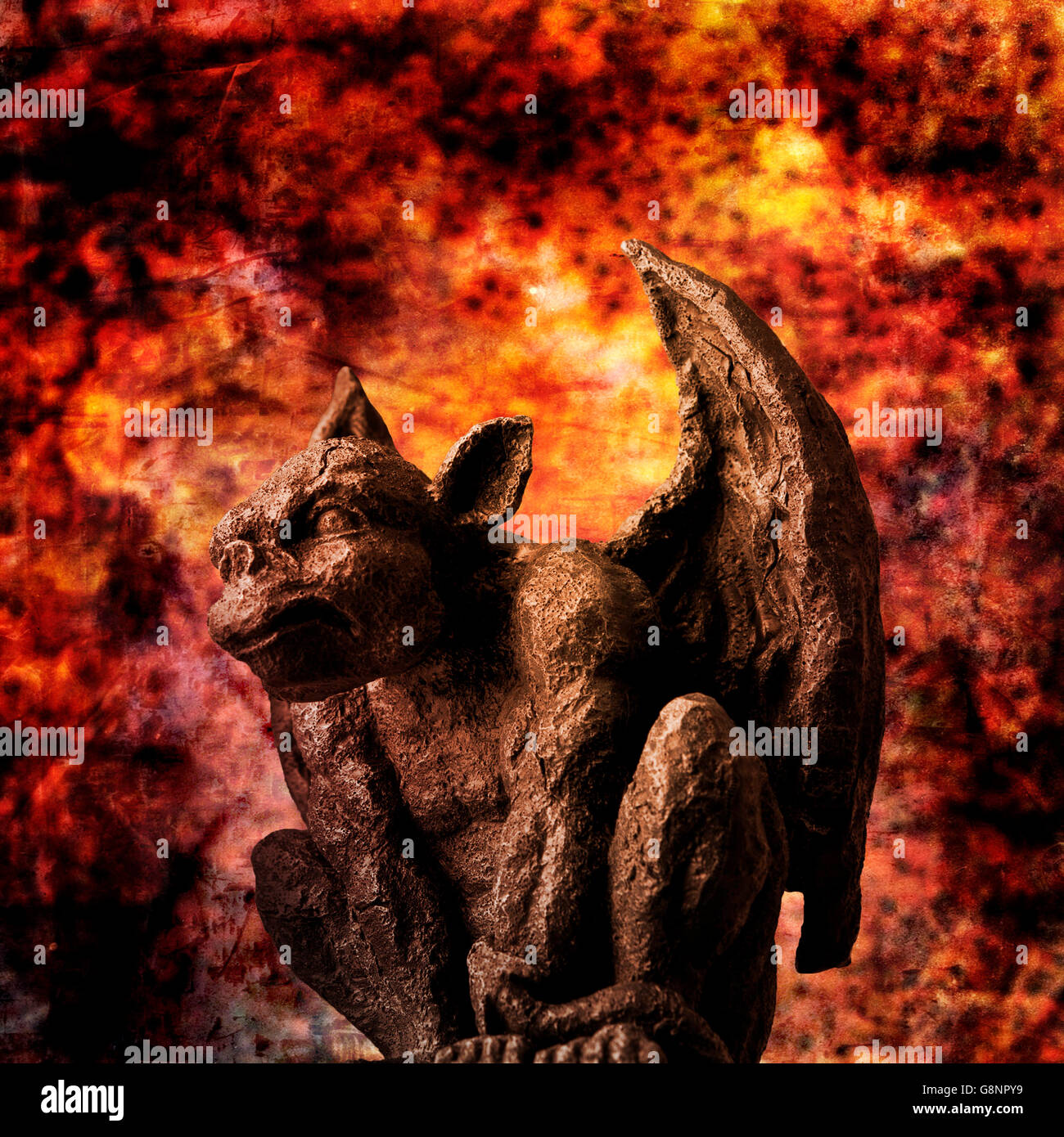 gargoyle statue composite with a red background Stock Photo - Alamy