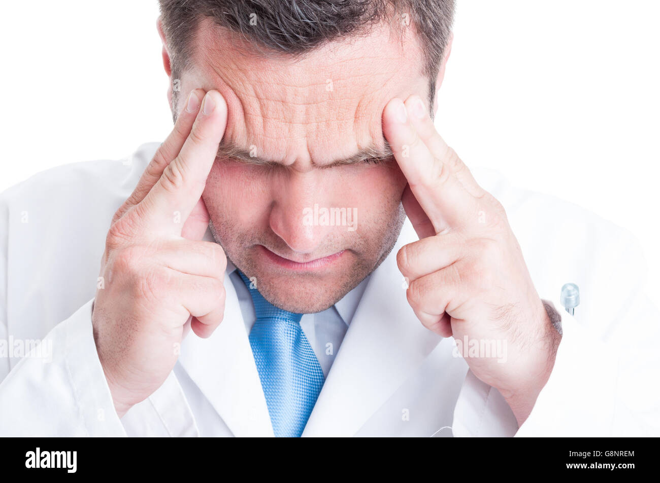 Close-up of male medic or doctor feeling a headache and pressing his ...