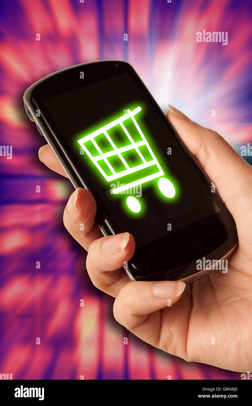 female hand holding a cell phone with a shopping cart icon on the ...