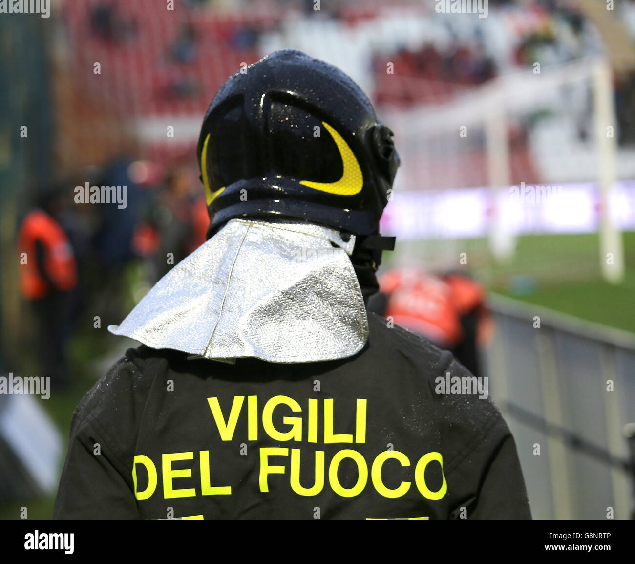 Italian firefighter with uniform with the inscription FIREFIGHTERS do ...