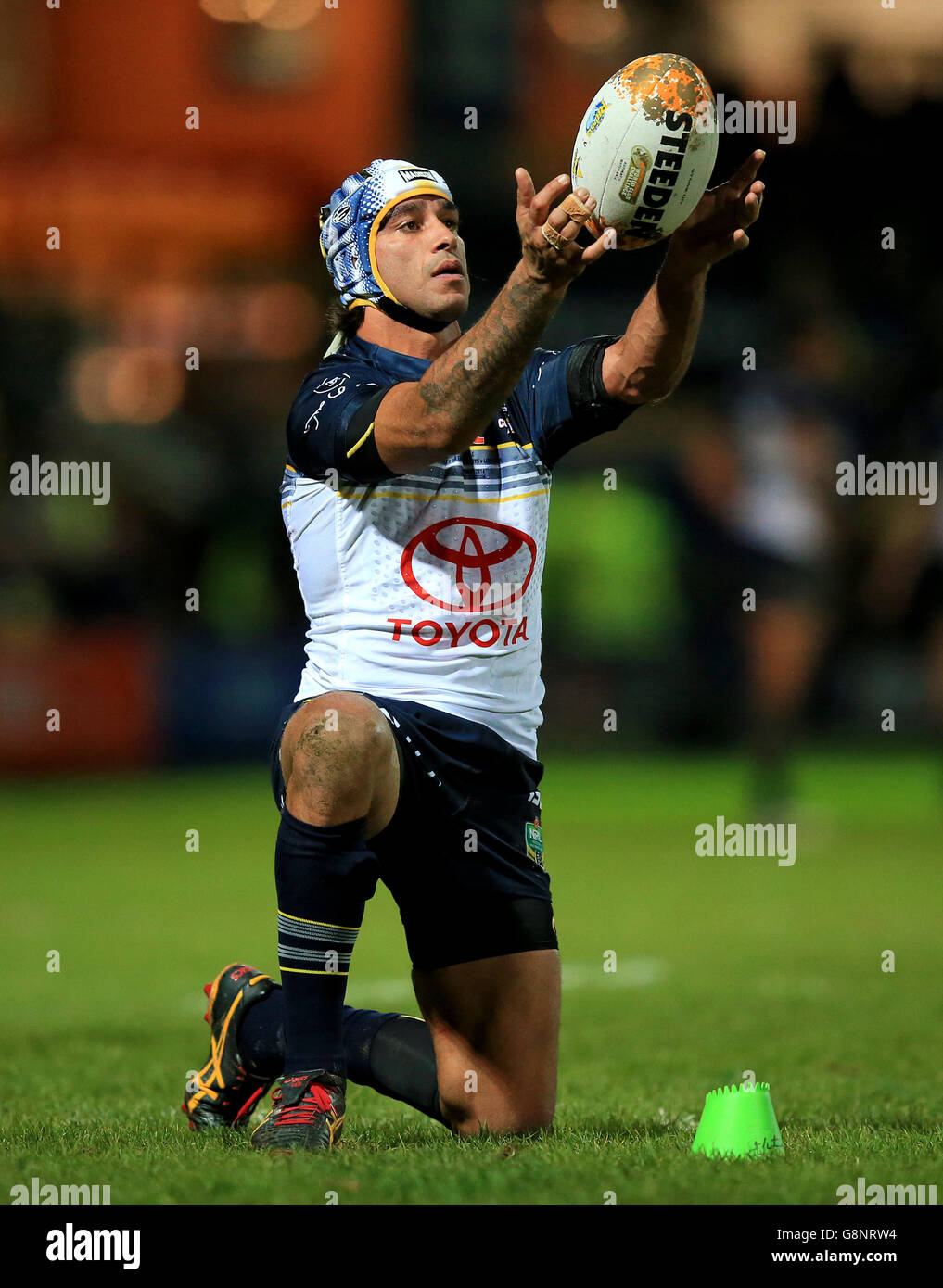 North queensland cowboys johnathan thurston hi-res stock photography ...