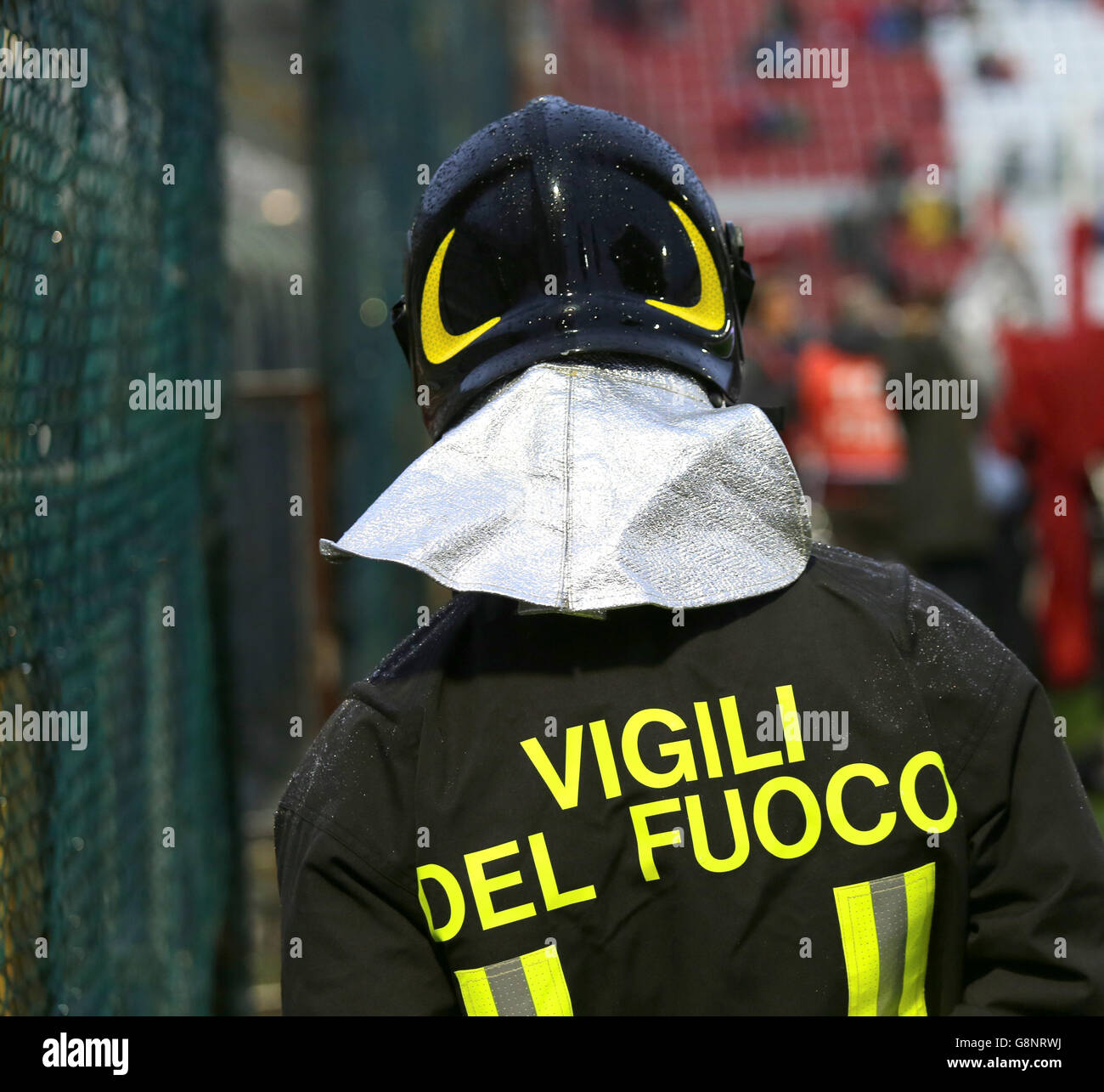 Italian firefighter with uniform with the inscription FIREFIGHTERS do ...