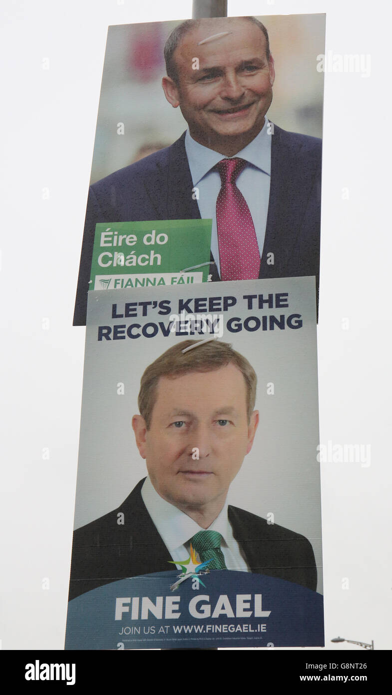 Campaign posters for Fianna Fail leader Micheal Martin, top, and Fine ...