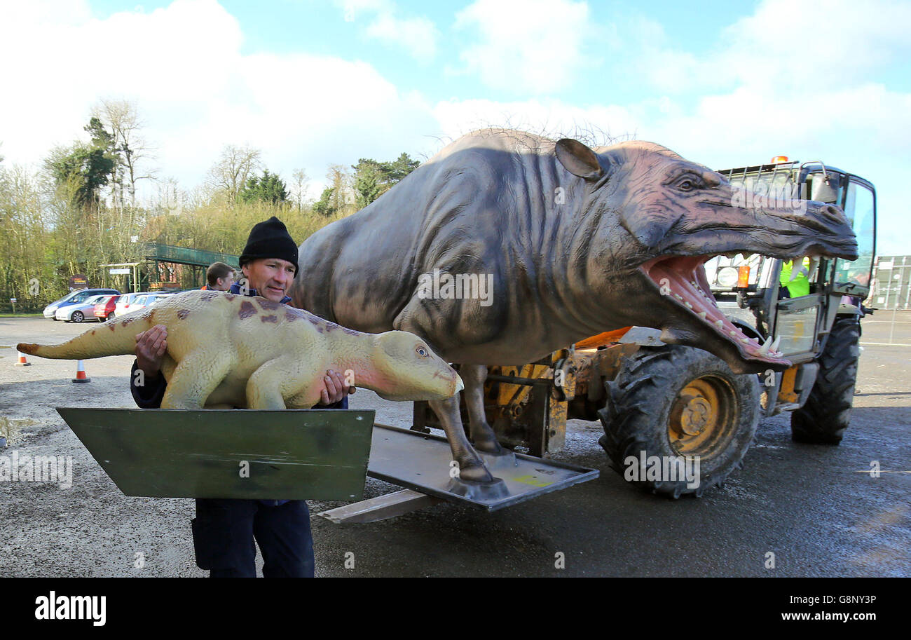 A lorry of dinosaurs is unloaded at Port Lympne Wild Animal Park near ...