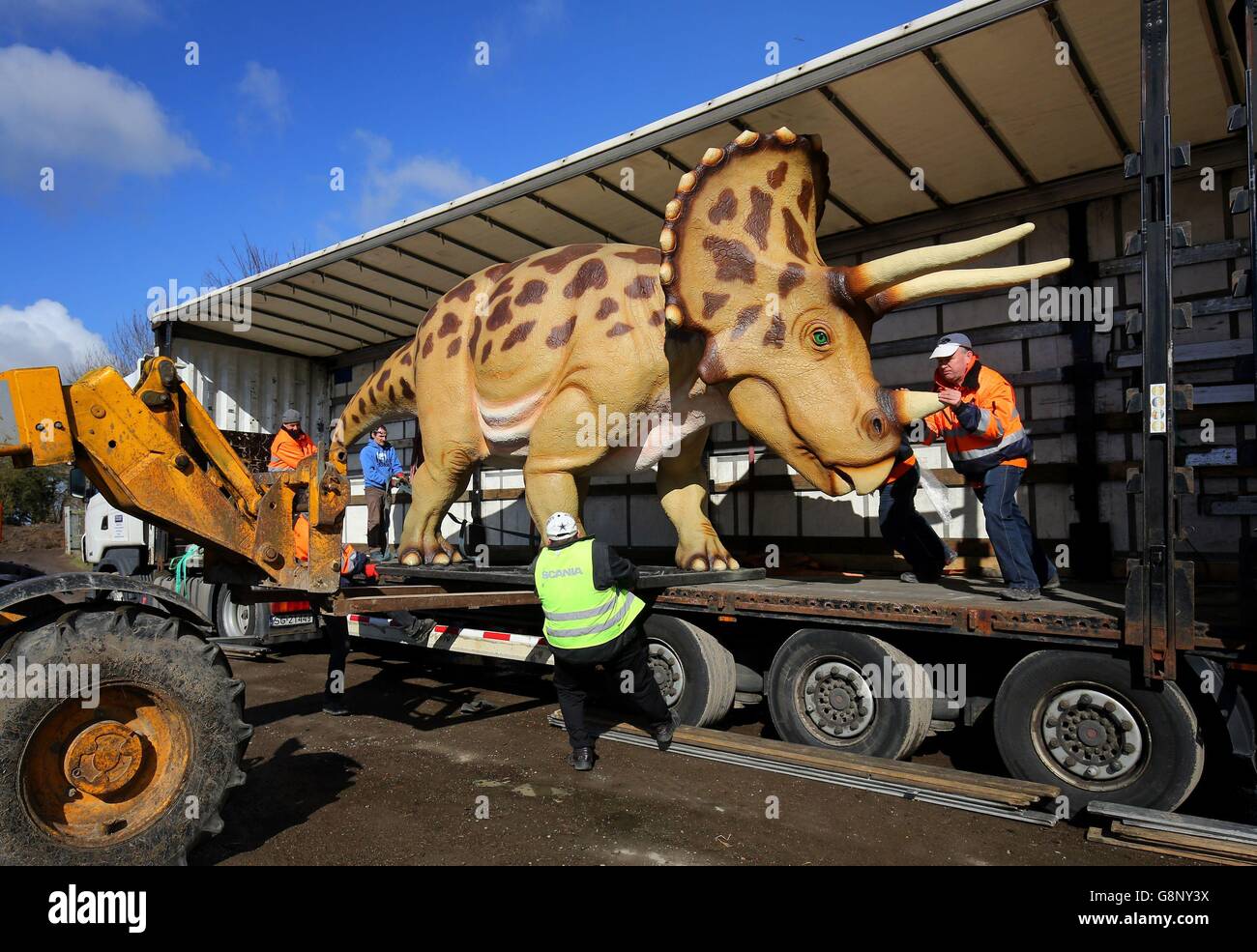 A lorry of dinosaurs is unloaded at Port Lympne Wild Animal Park near ...