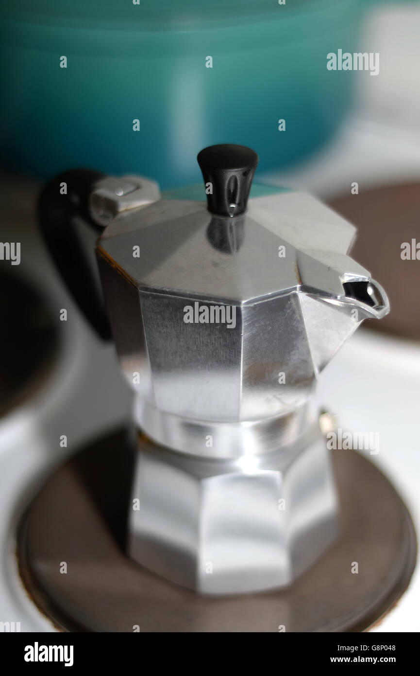 A stovetop espresso coffee maker on an electric hob, London Stock Photo ...