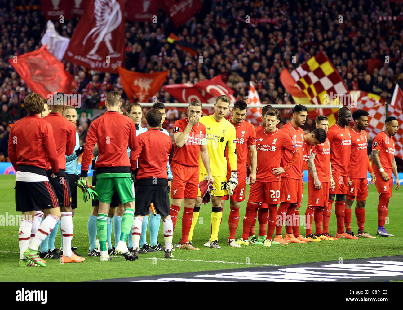 Manchester United and Liverpool players shake hands before the game ...