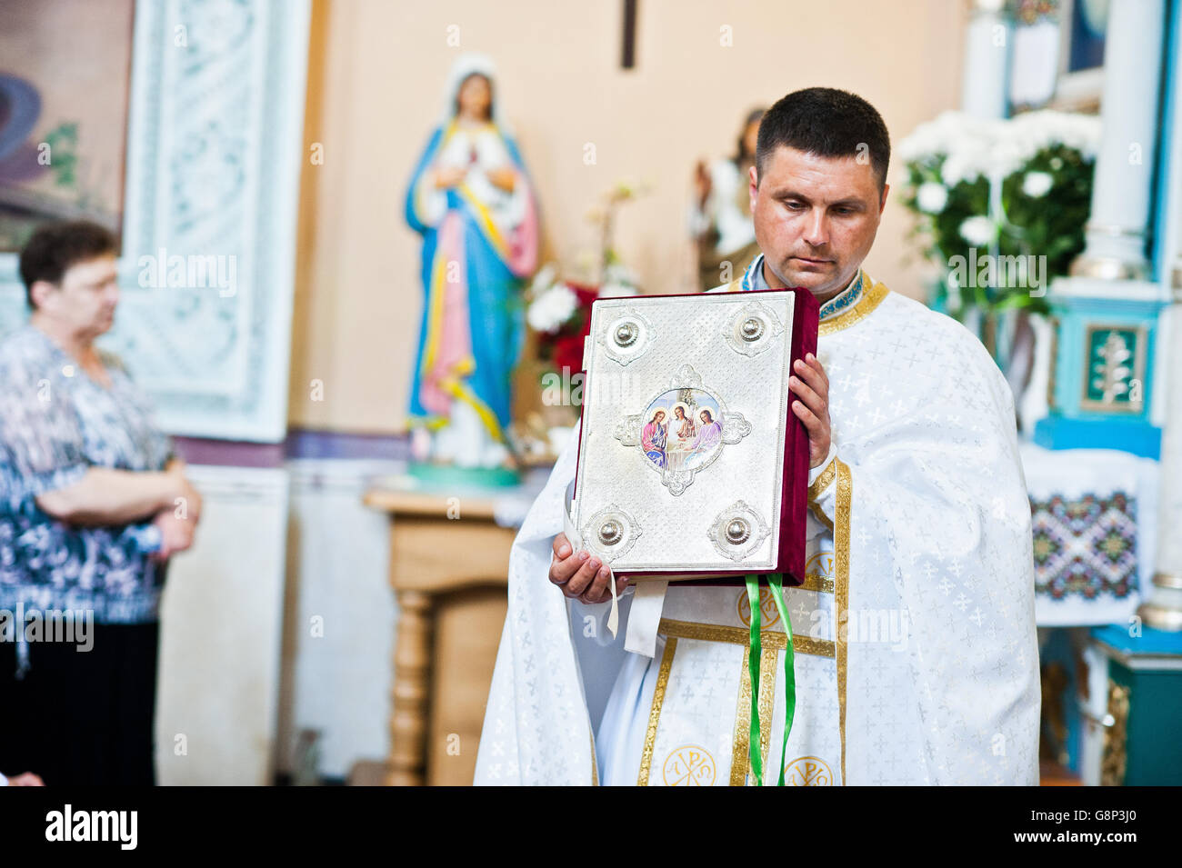 First holy communion priest hi-res stock photography and images - Alamy