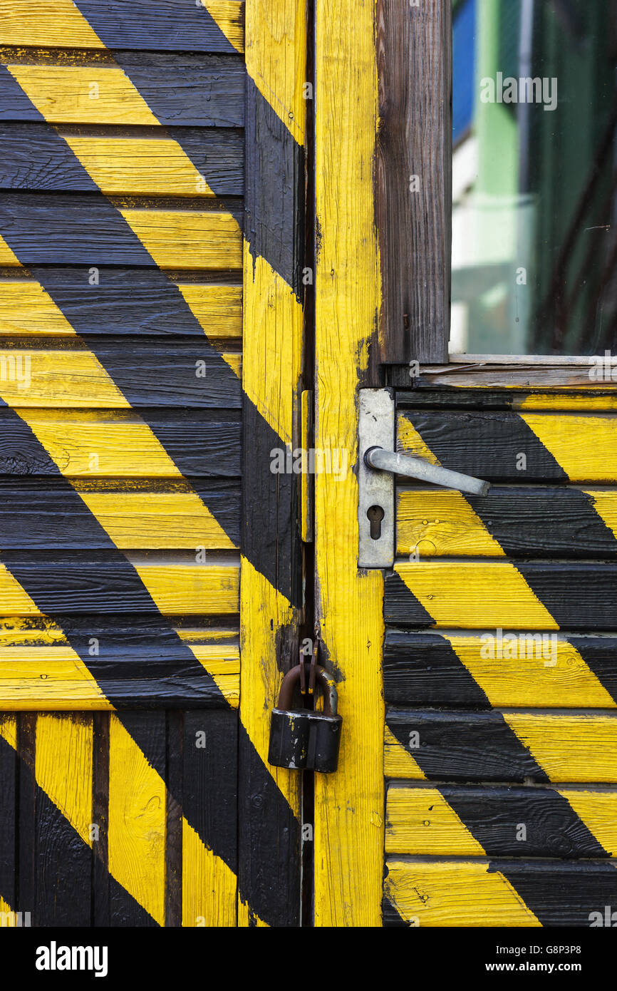 Black and yellow wall of the security booth Stock Photo - Alamy