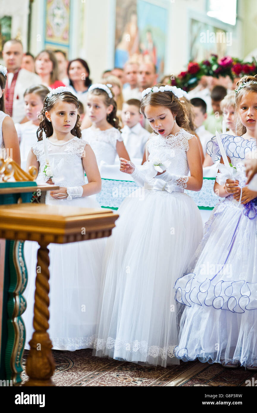 Mukyluntsi , Ukraine - 26 june, 2016: First holy communion Stock Photo ...