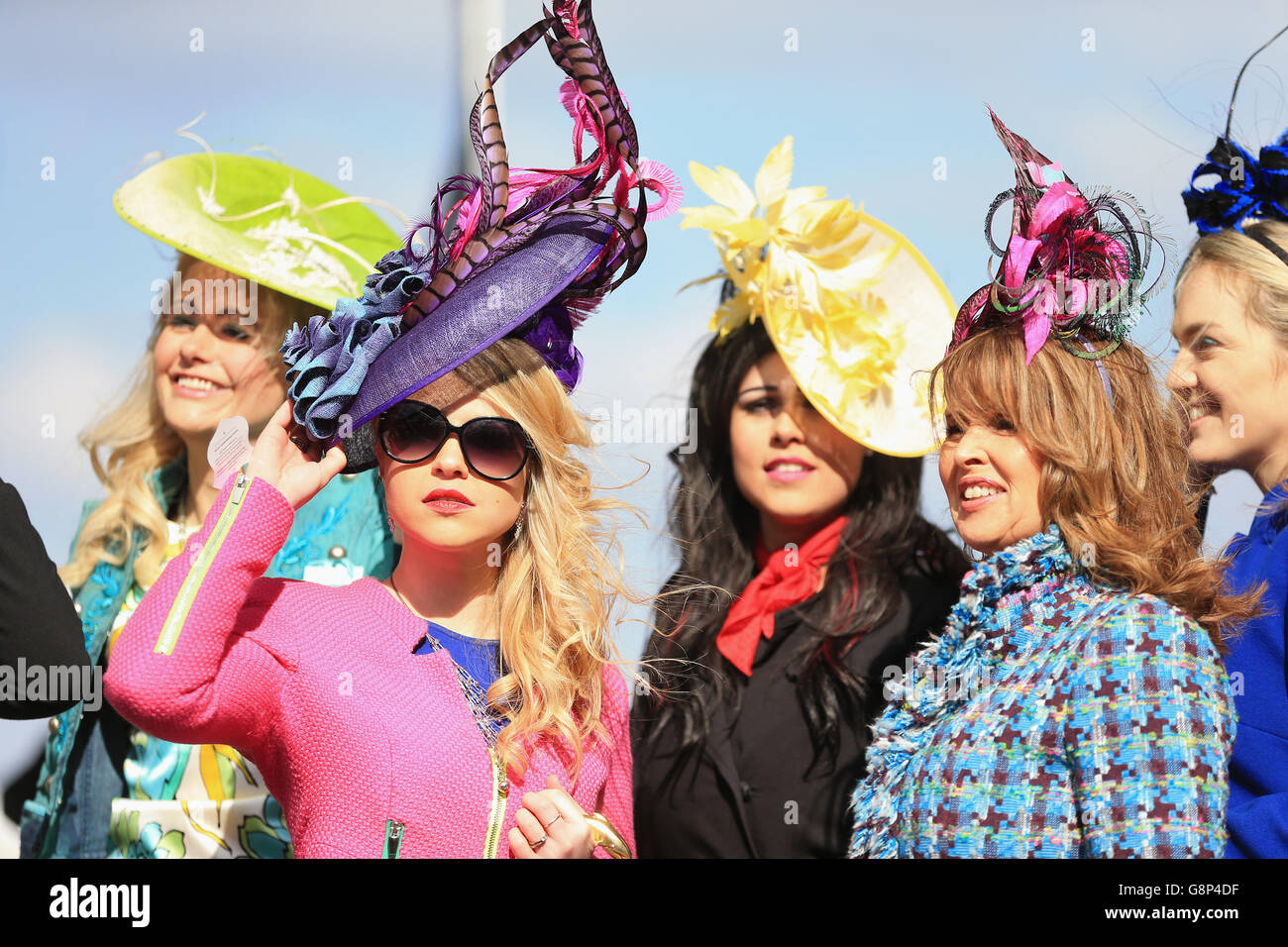 Female racegoers in fancy hats during Ladies Day of the 2016 Cheltenham ...