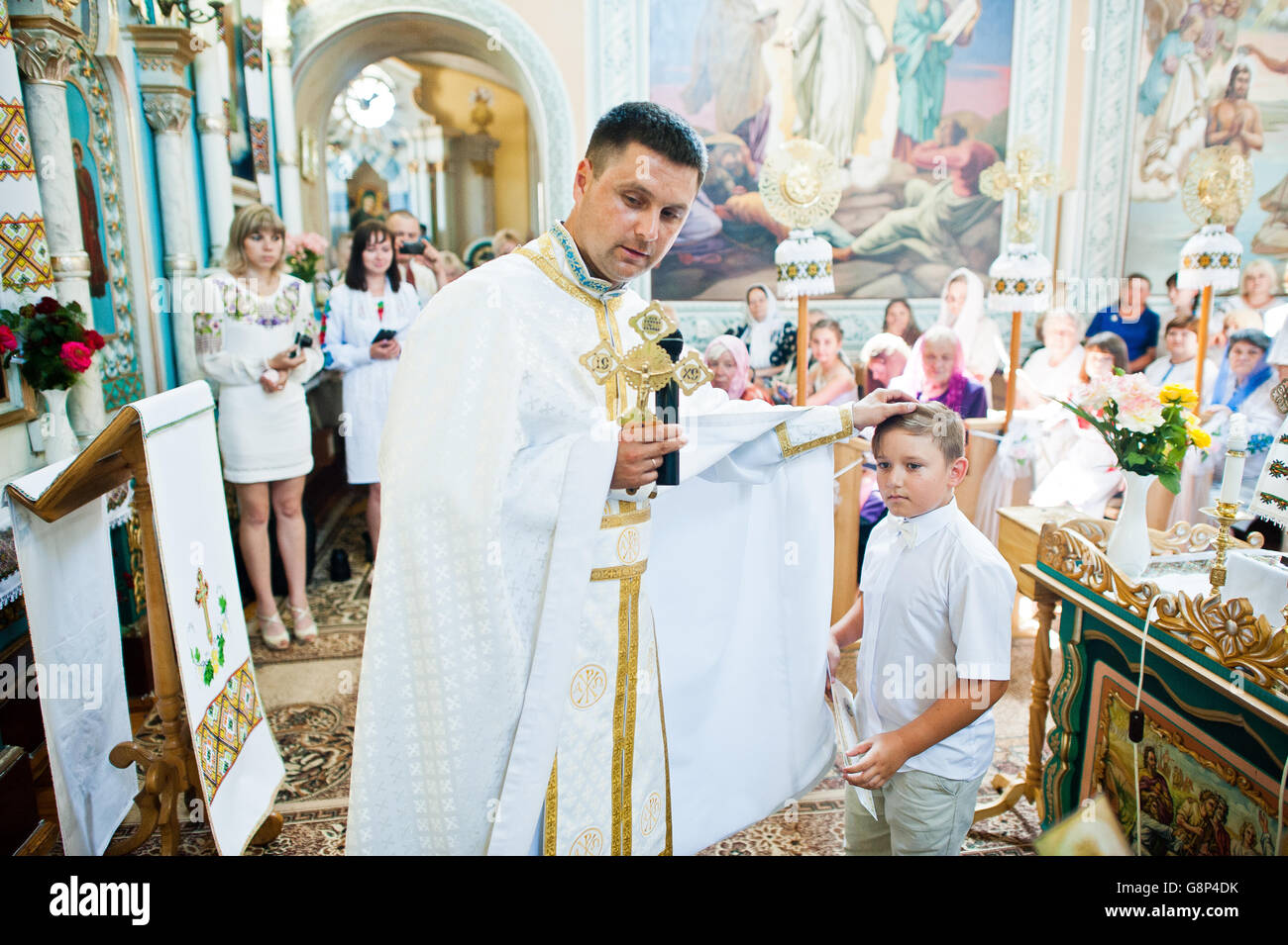 Mukyluntsi , Ukraine - 26 june, 2016: First holy communion Stock Photo ...