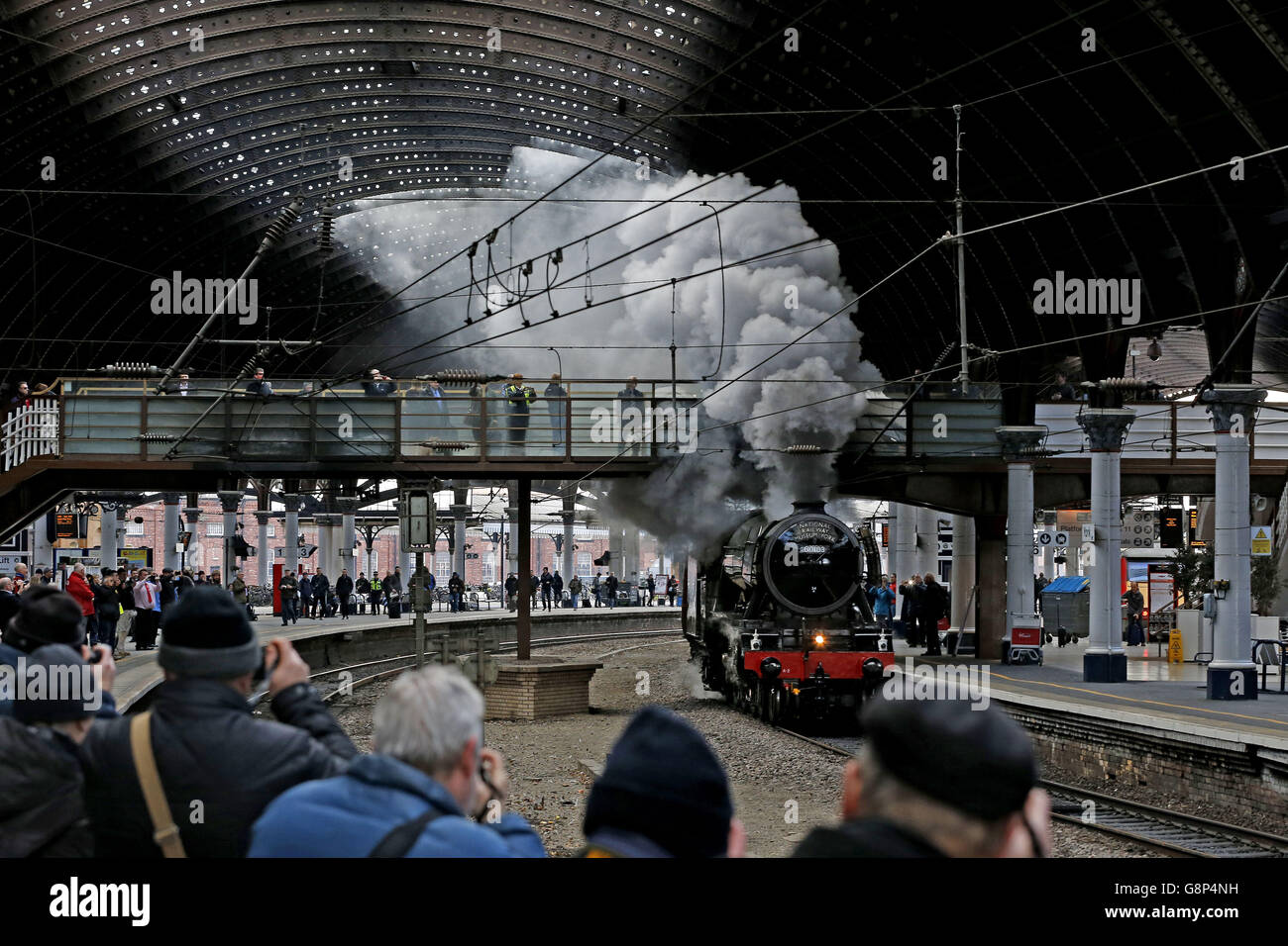 The Flying Scotsman, painted in its traditional colours, passes through ...