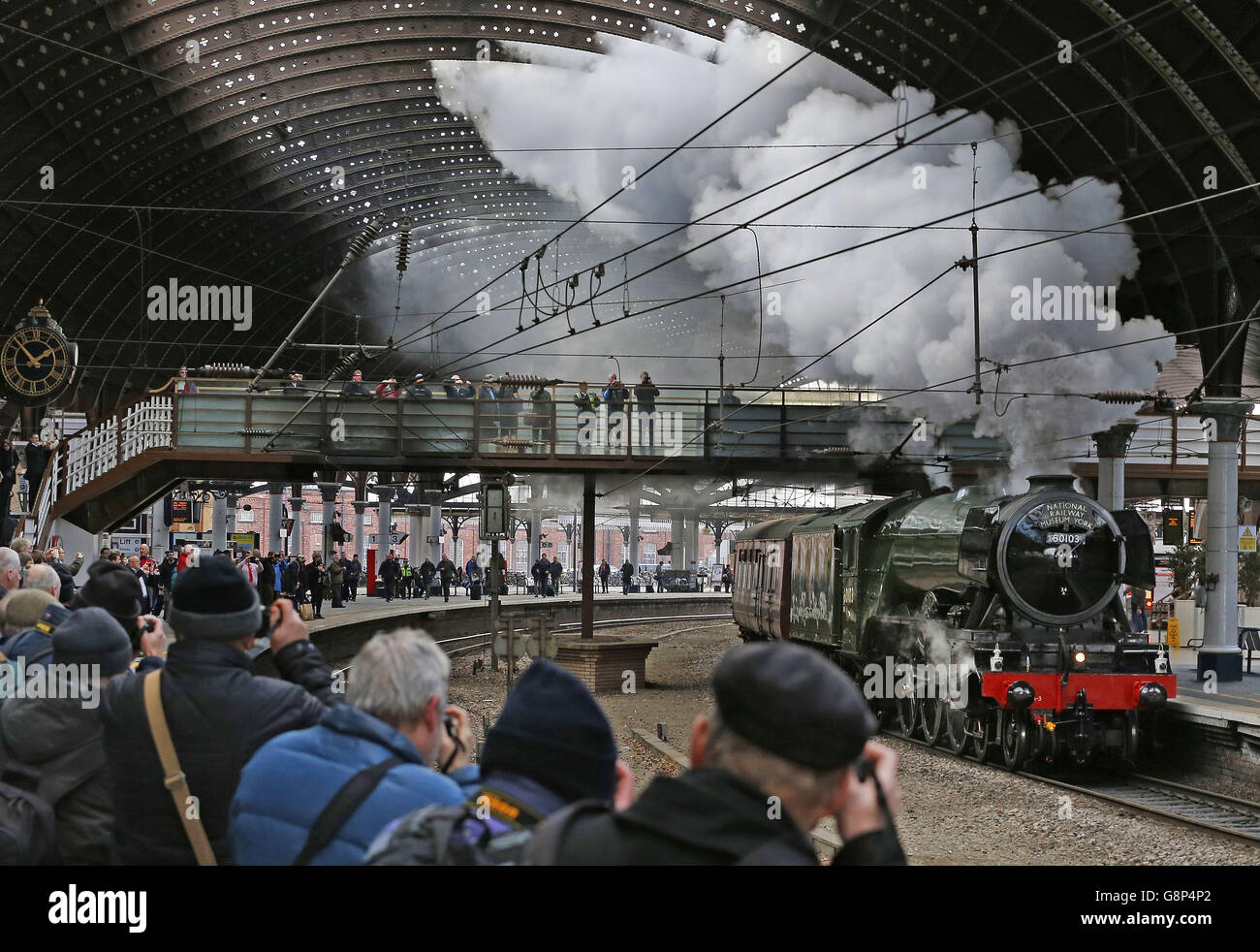 The Flying Scotsman, painted in its traditional colours, passes through ...