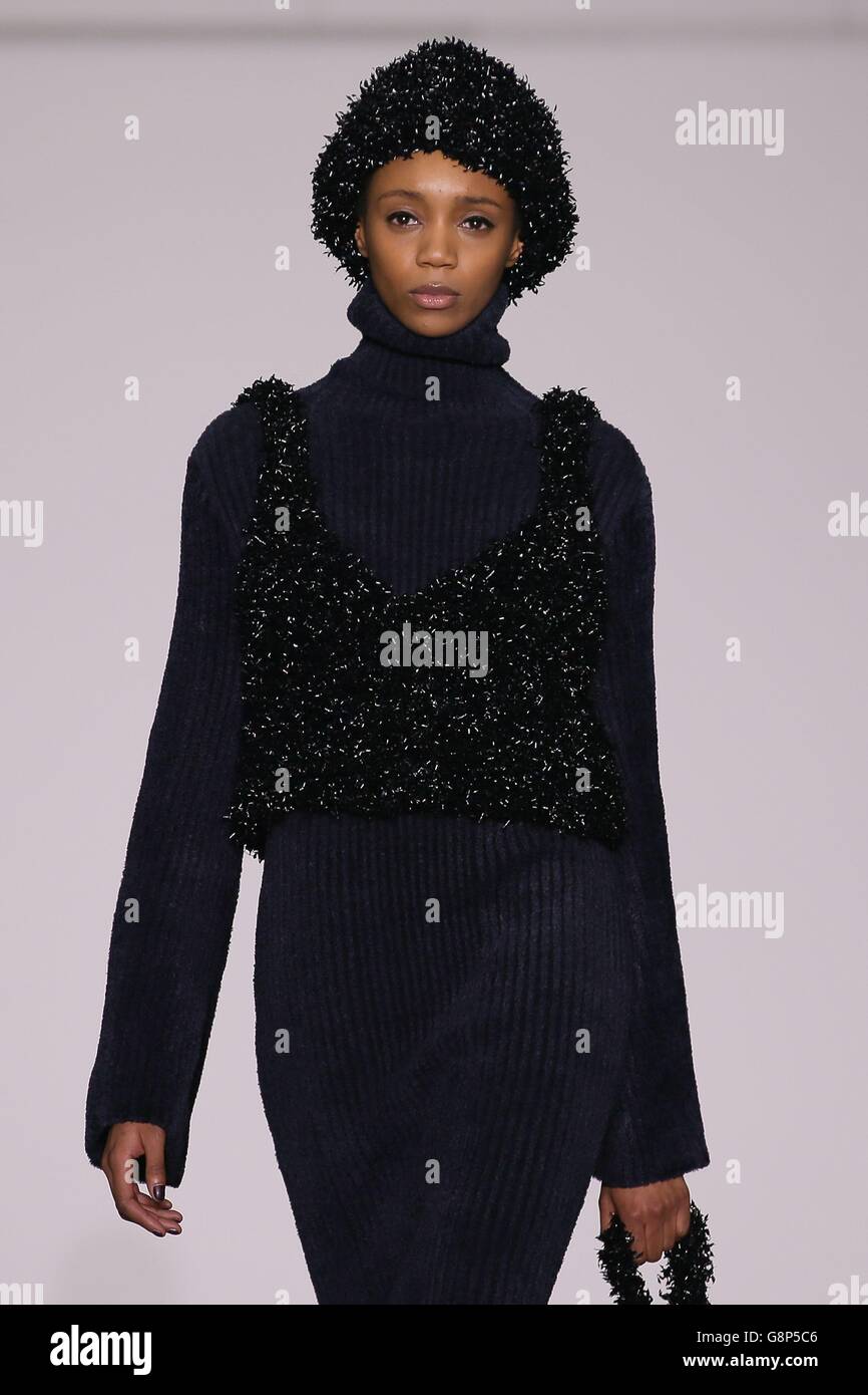 Xiao Li Catwalk - London Fashion Week 2016. A model on the catwalk ...