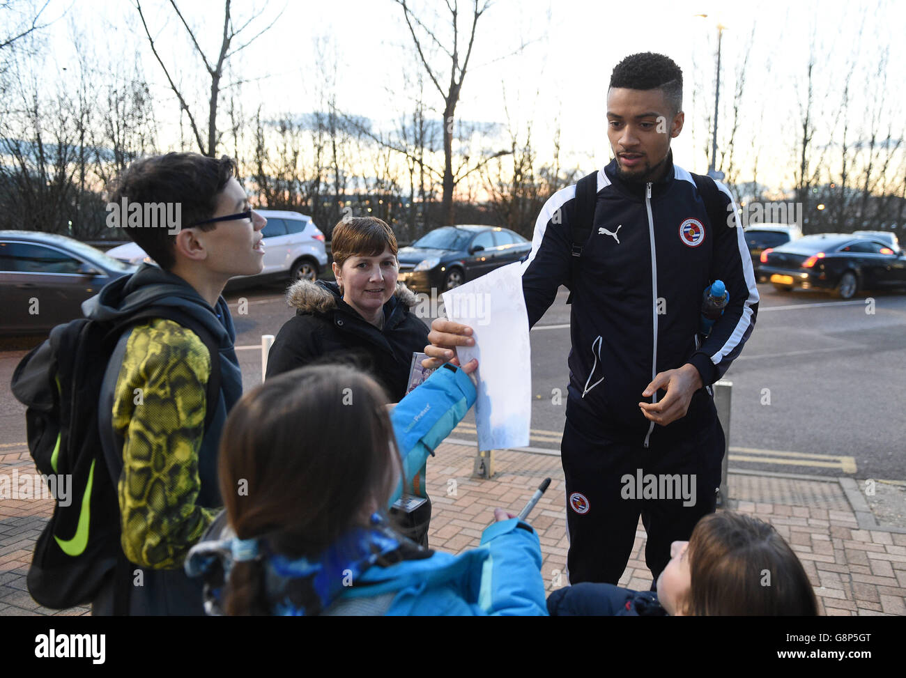 Reading's Michael Hector signs autographs for fans as he arrives at the ...