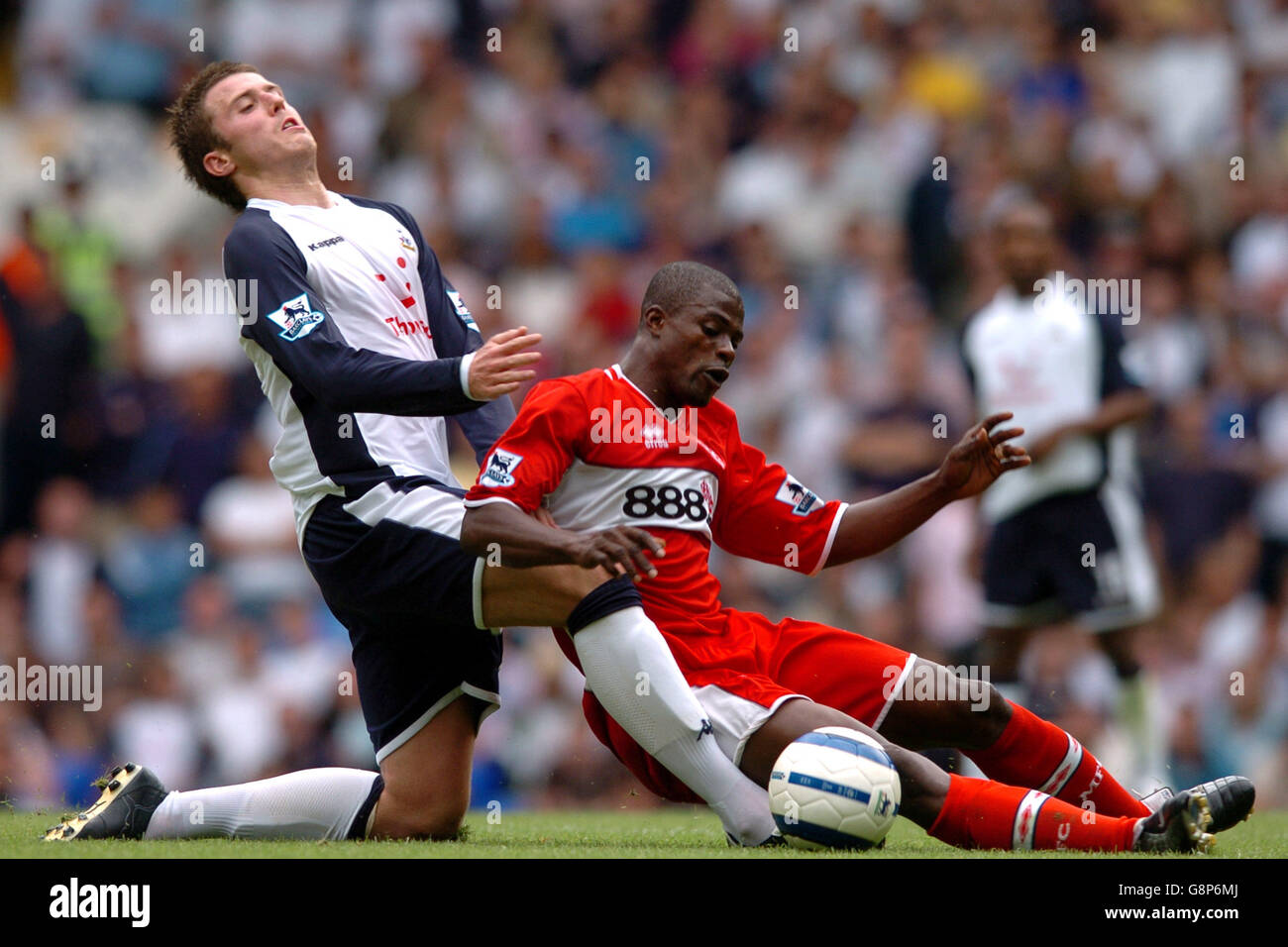 Tottenham Hotspur's Michael Carrick (l) and Middlesbrough's George ...