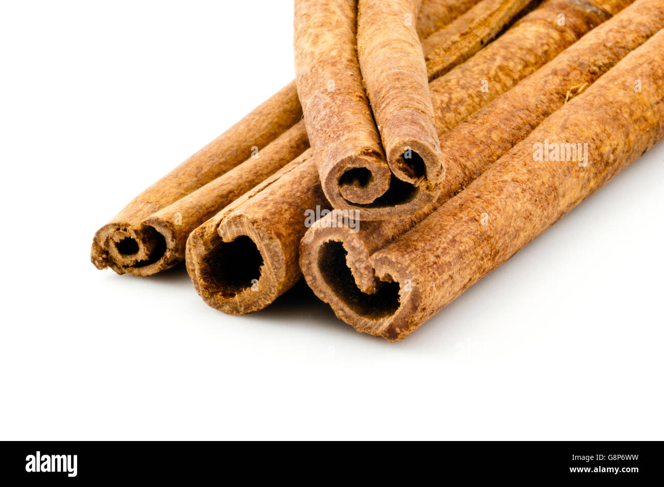 Brown Cinnamon Sticks Isolated Over White Background Stock Photo - Alamy