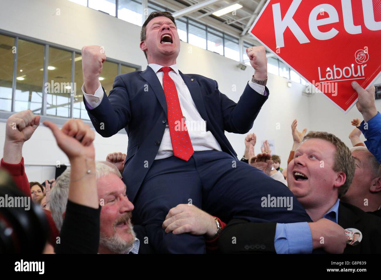 Labour candidate Alan Kelly is hoisted into the air as he celebrates ...
