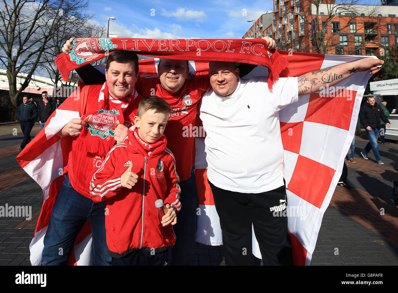 Liverpool supporters pose on Wembley Way outside Wembley Stadium Stock ...