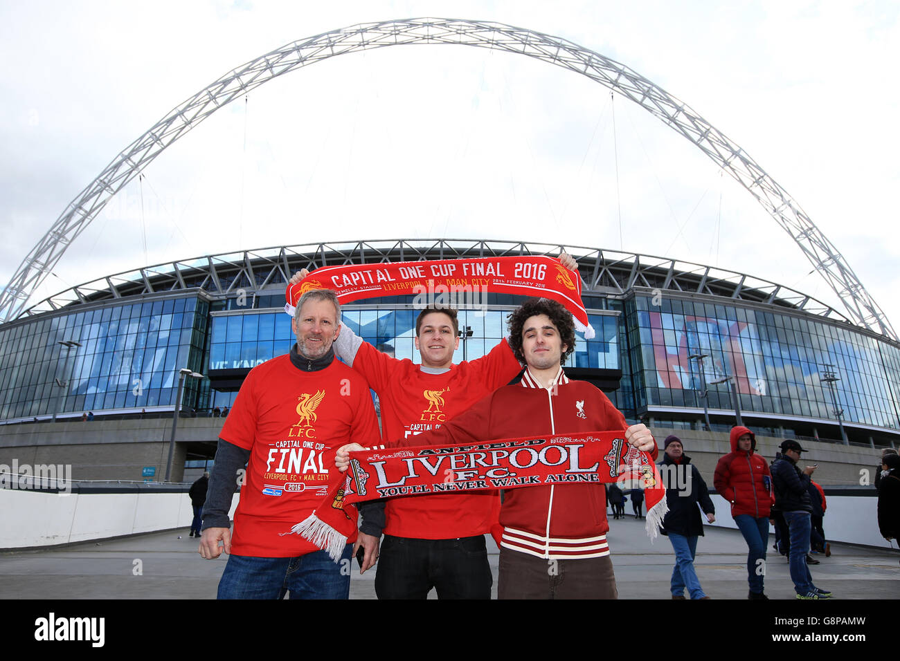Liverpool supporters pose on Wembley Way outside Wembley Stadium Stock ... Liverpool supporters pose on Wembley Way outside Wembley Stadium Stock ...