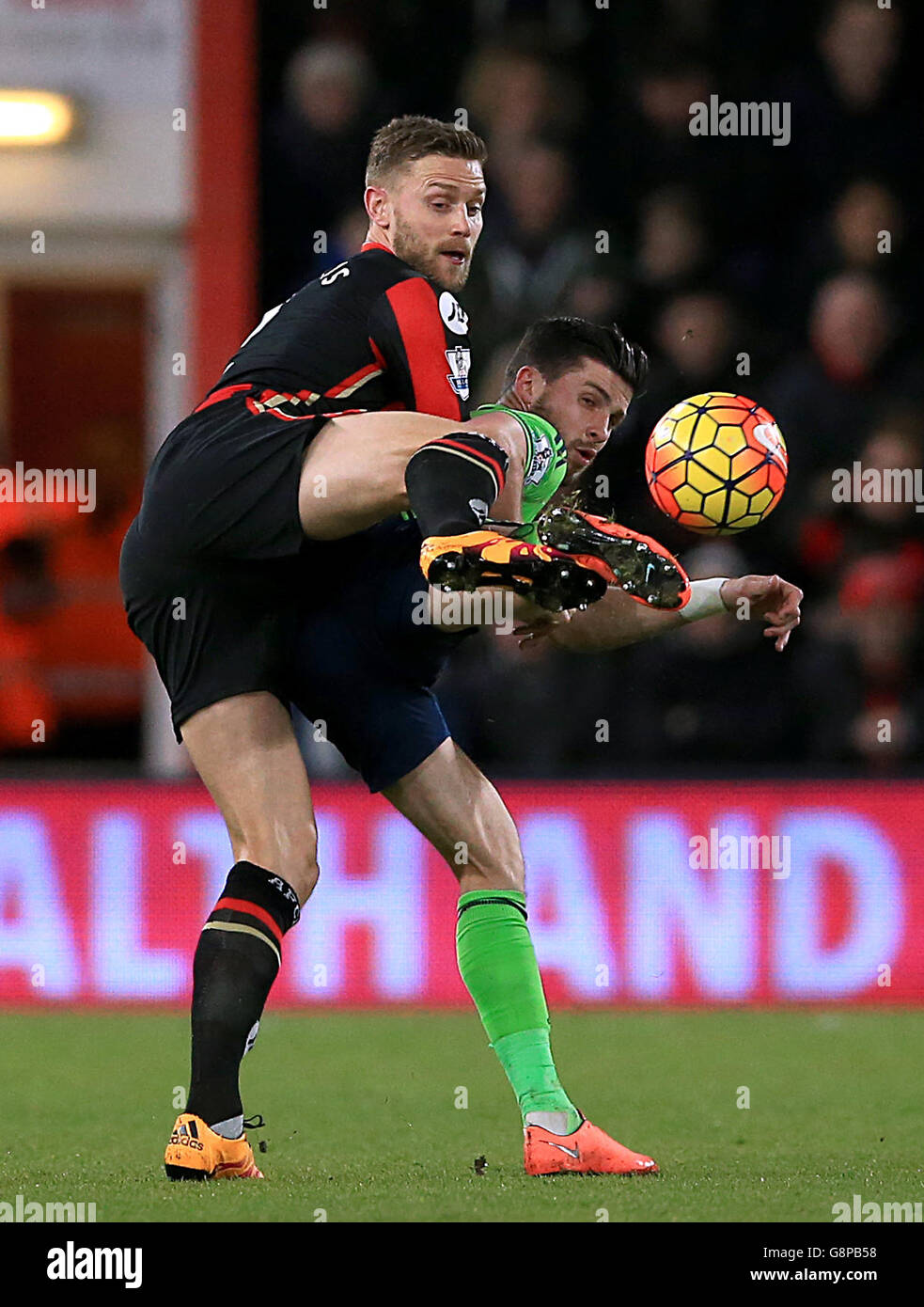 AFC Bournemouth's Simon Francis and Southampton's Shane Long (right ...