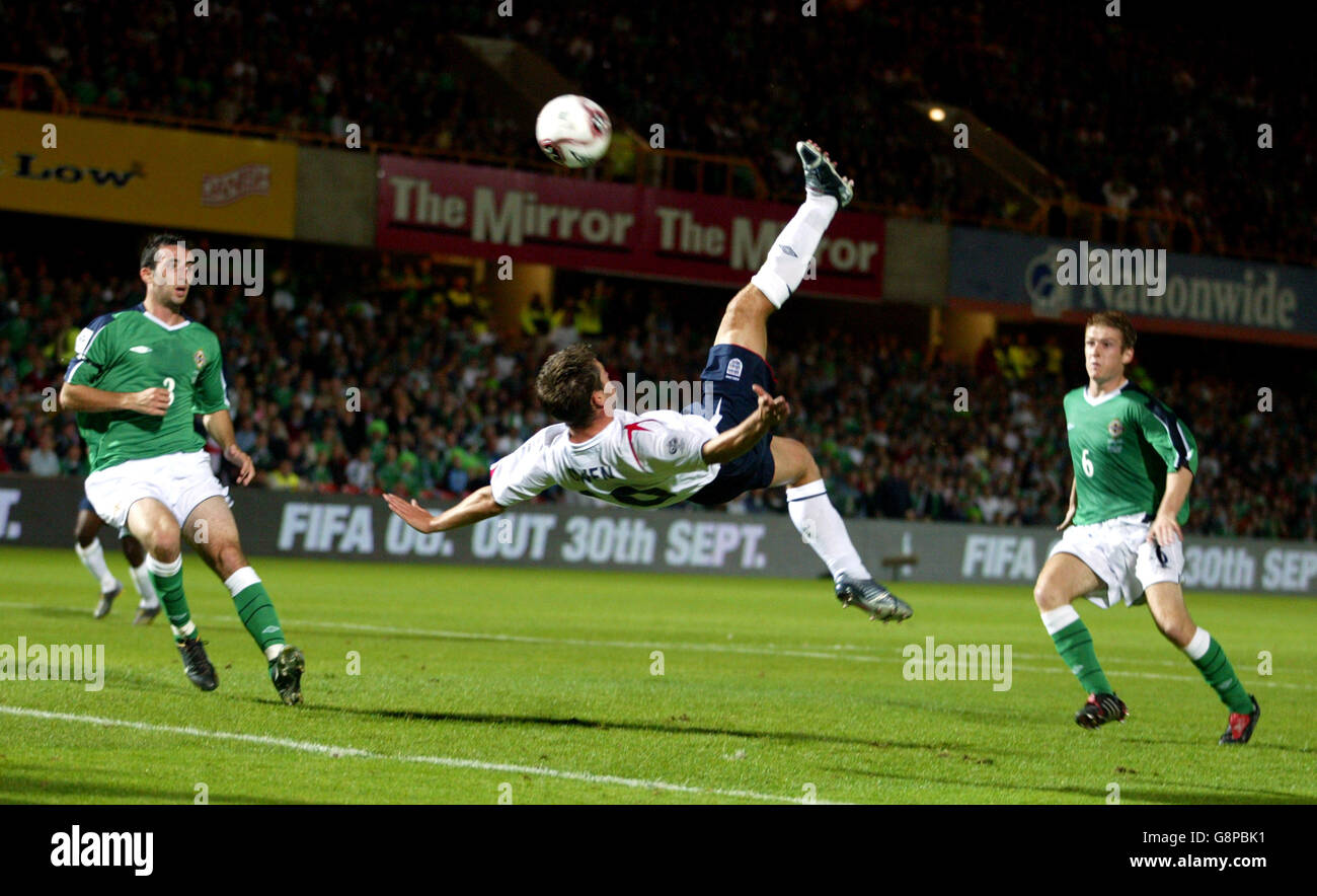 Full length overhead kick ball action mangsb hi-res stock photography ...