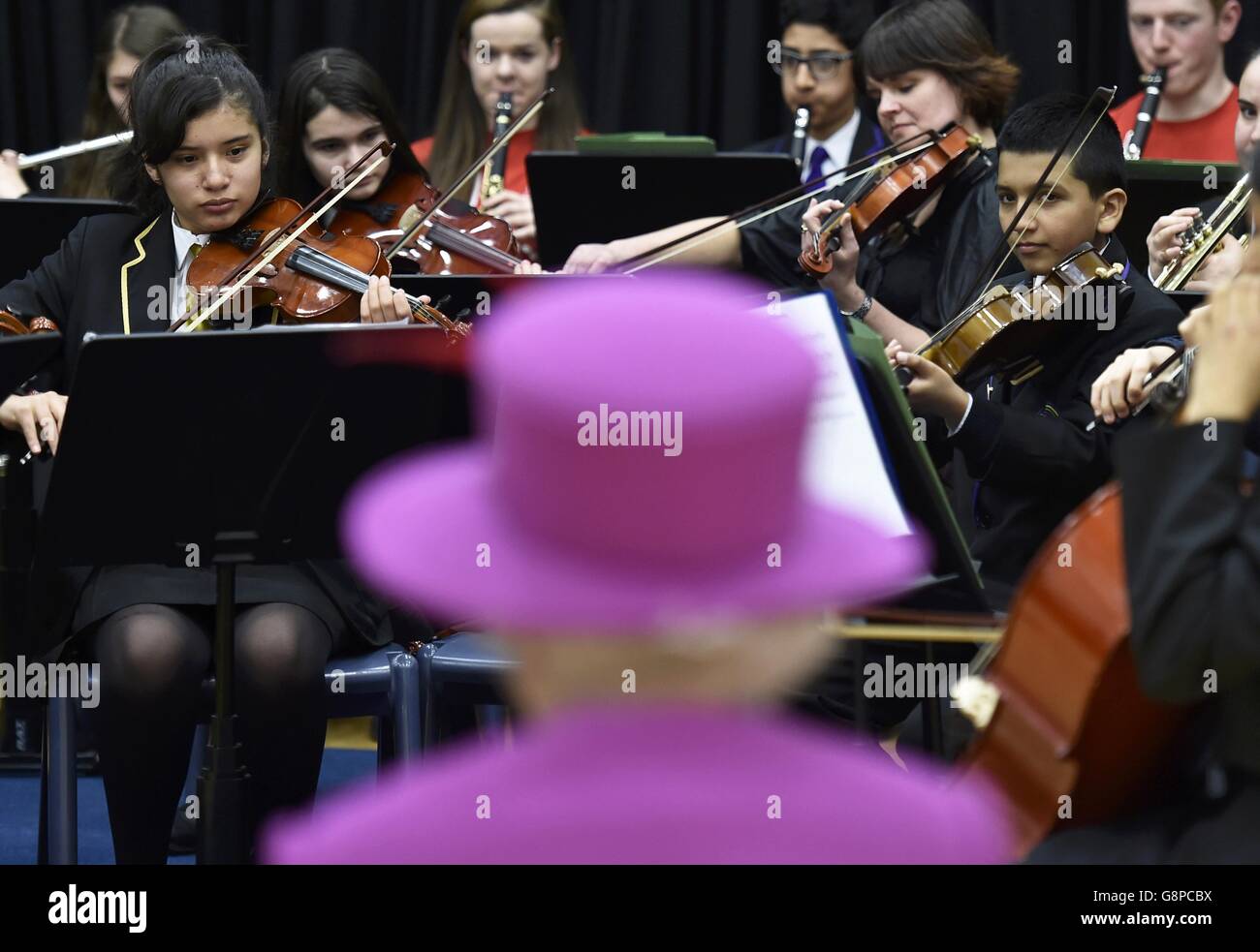 Queen Elizabeth II watches the National Youth Orchestra of Great ...