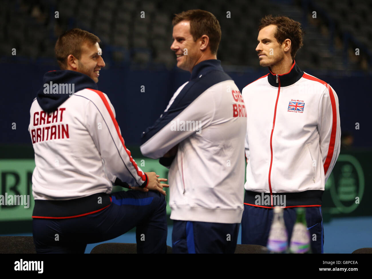 Great Britain captain Leon Smith (centre) with Dan Evans (left) and ... Great Britain captain Leon Smith (centre) with Dan Evans (left) and ...