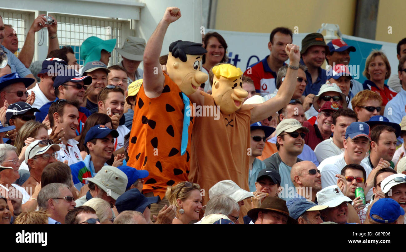 Fans of England's Andrew Flintoff show off their Flintsone costumes ...