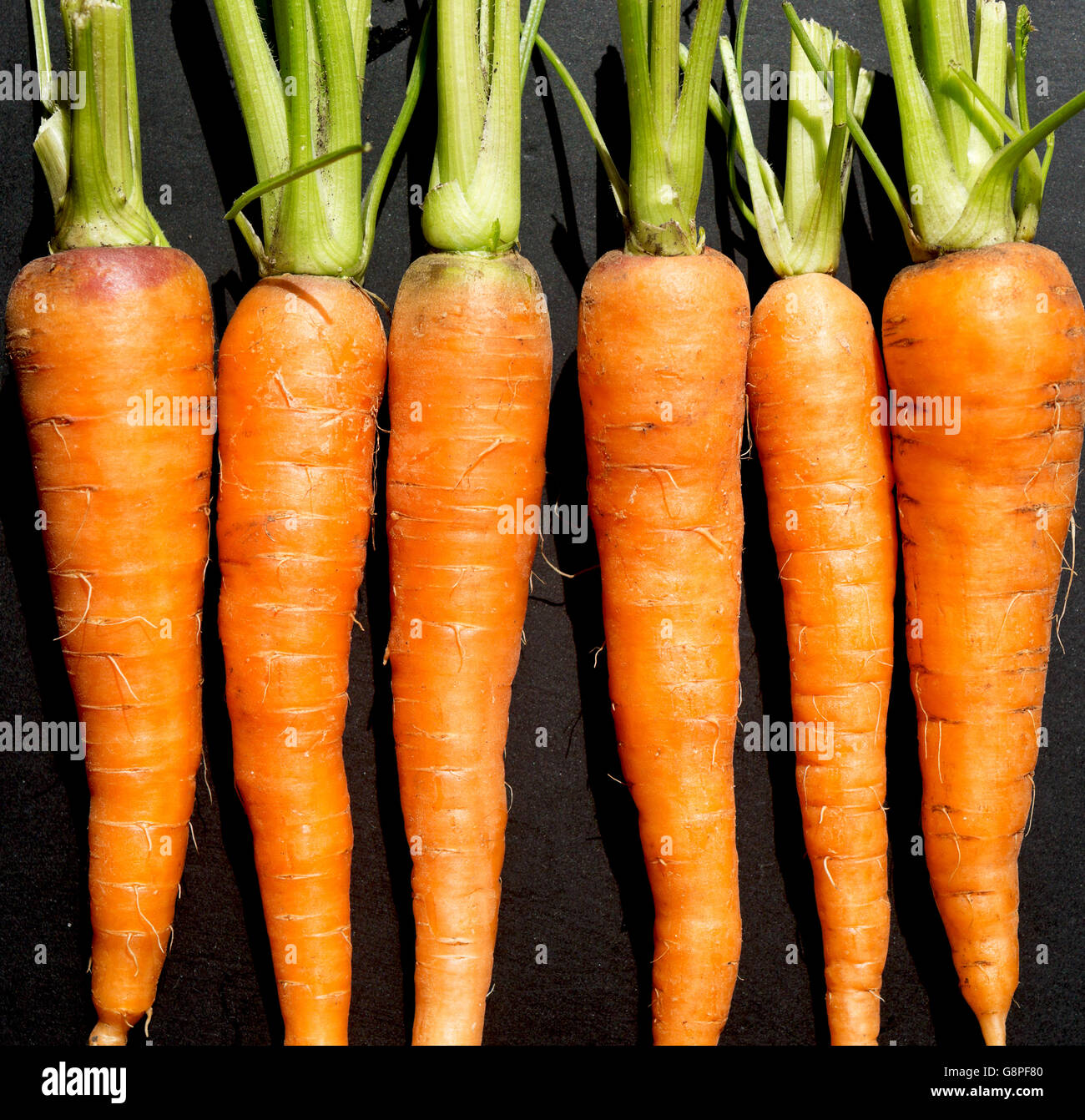 Raw dark carrots hi-res stock photography and images - Alamy