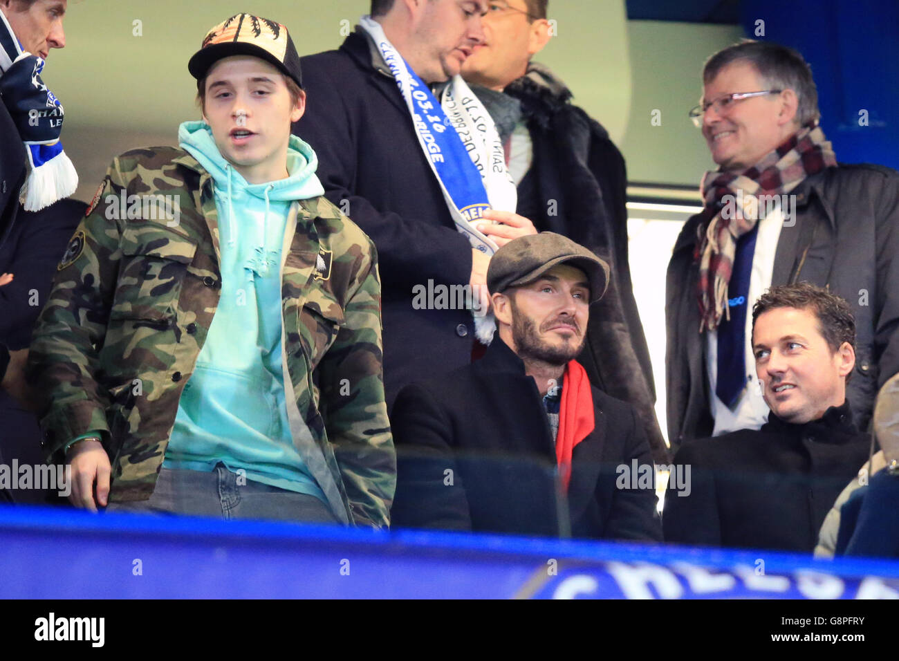 David Beckham (centre) and Brooklyn Beckham in the stands Stock Photo ...