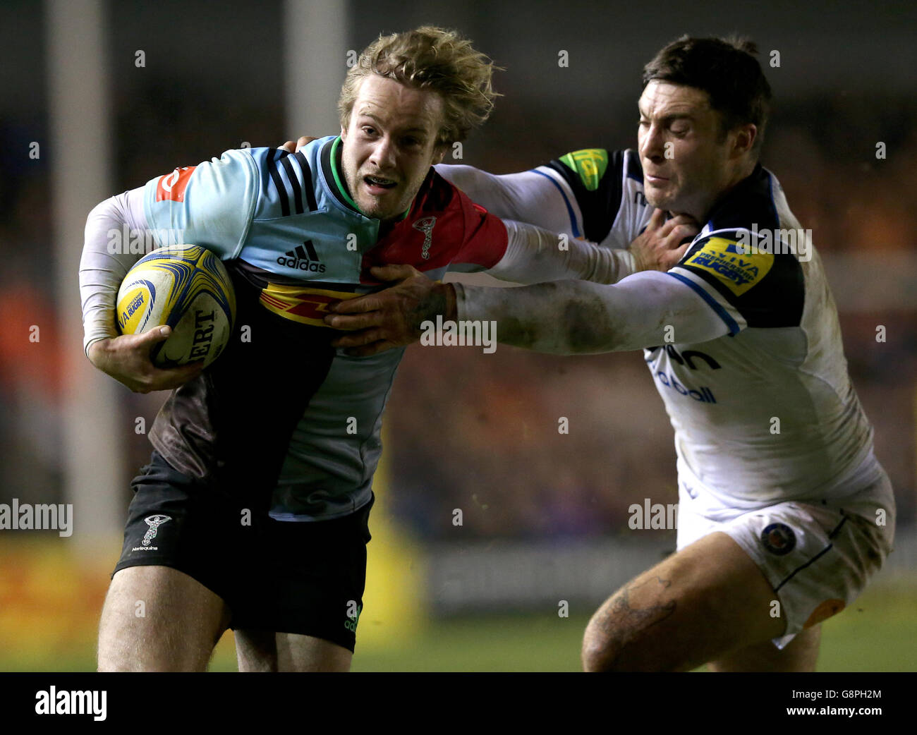 Harlequins' Charlie Walker gets away from Bath Rugby's Matt Banahan to ...